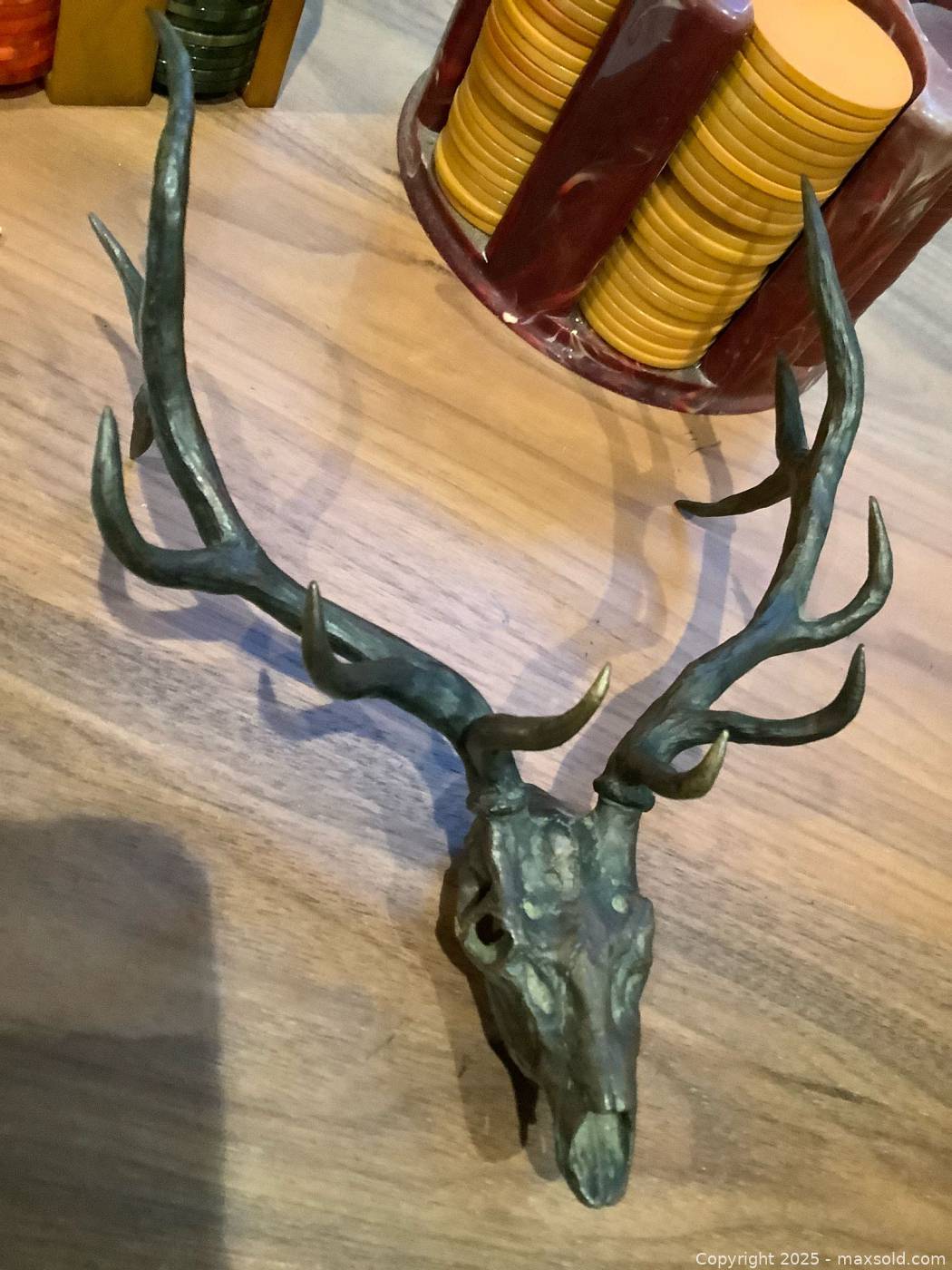 Bakelite poker chip sets and metal deer skull decor | Maxsold