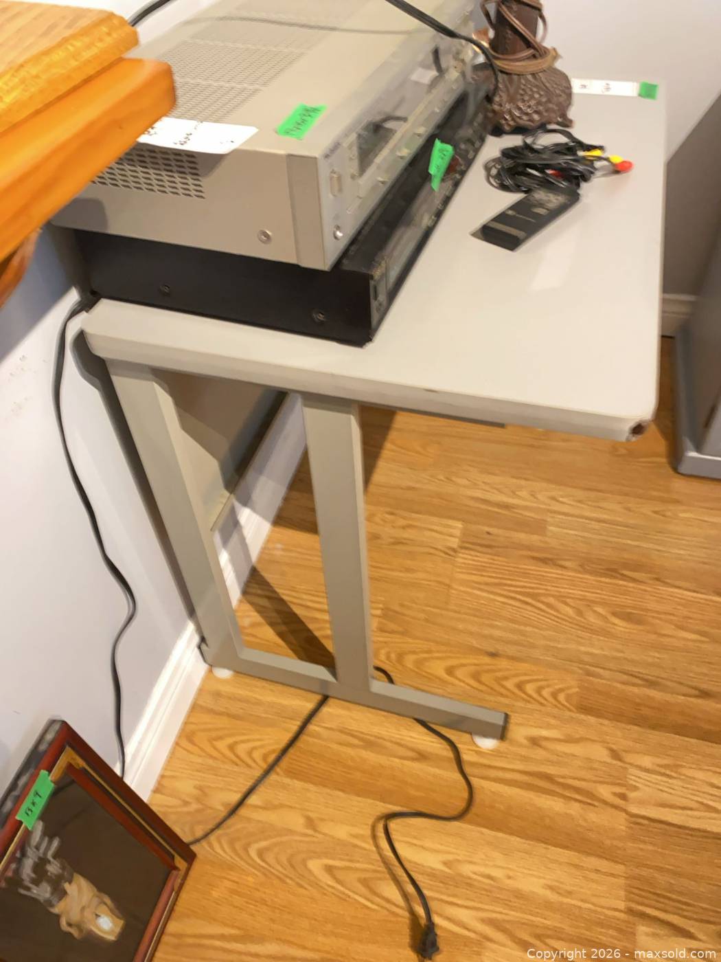 Melamine top utility table with metal legs | Maxsold