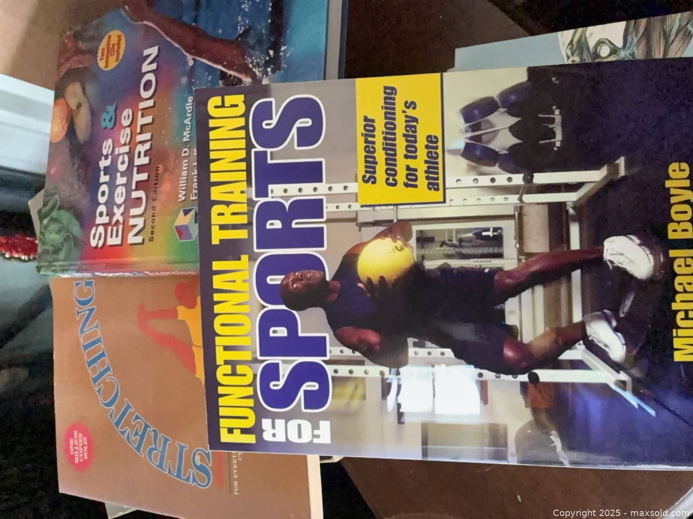 Lot of 10 fitness and sports training books | Maxsold