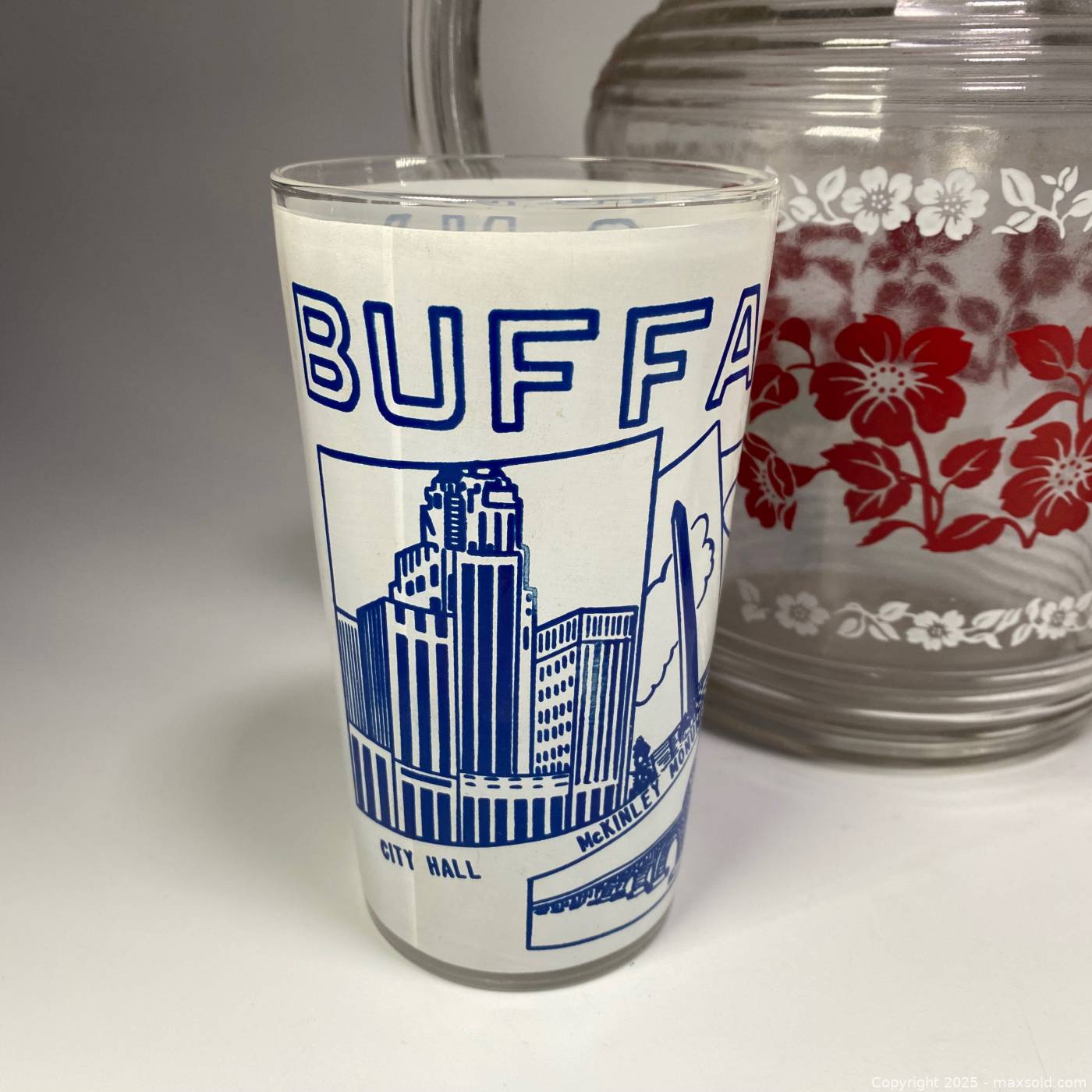 Hazel Atlas floral pitcher with Buffalo and Tony the Tiger tumblers ...