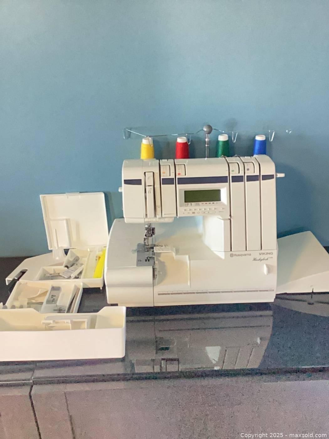 Husqvarna Viking Huskylock 936 Serger with accessories | Maxsold
