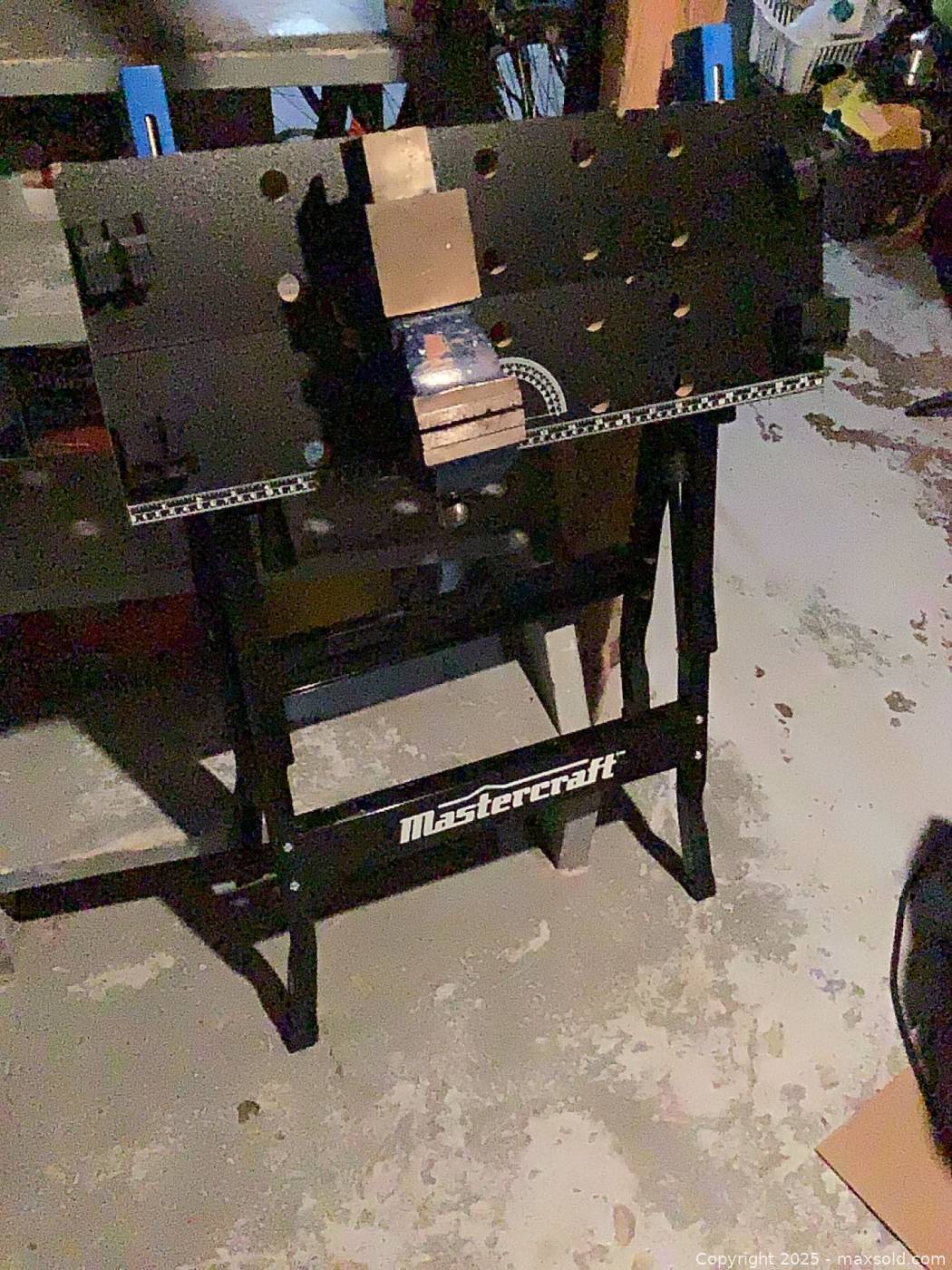Mastercraft folding workbench with vise | Maxsold