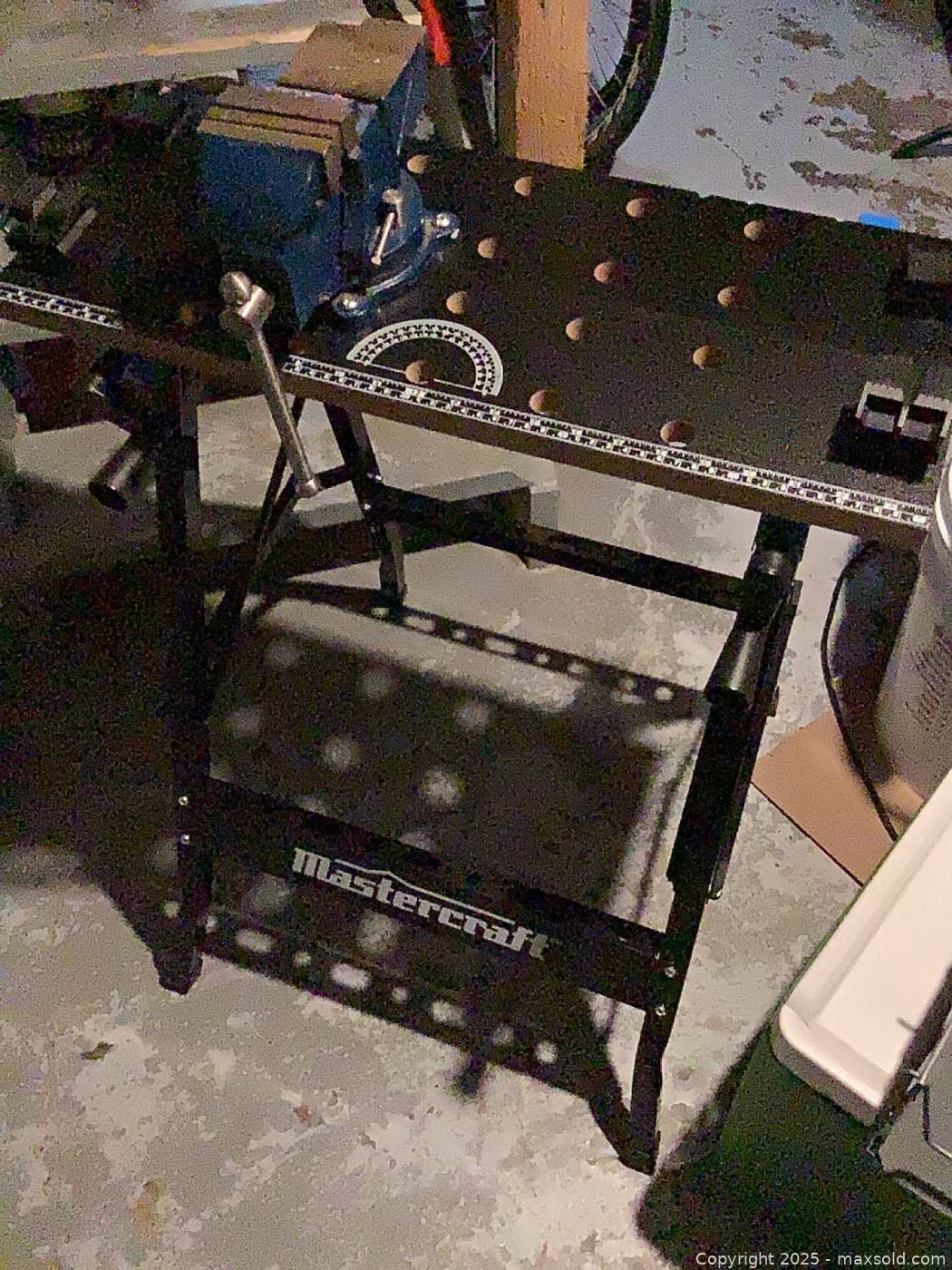Mastercraft folding workbench with vise | Maxsold