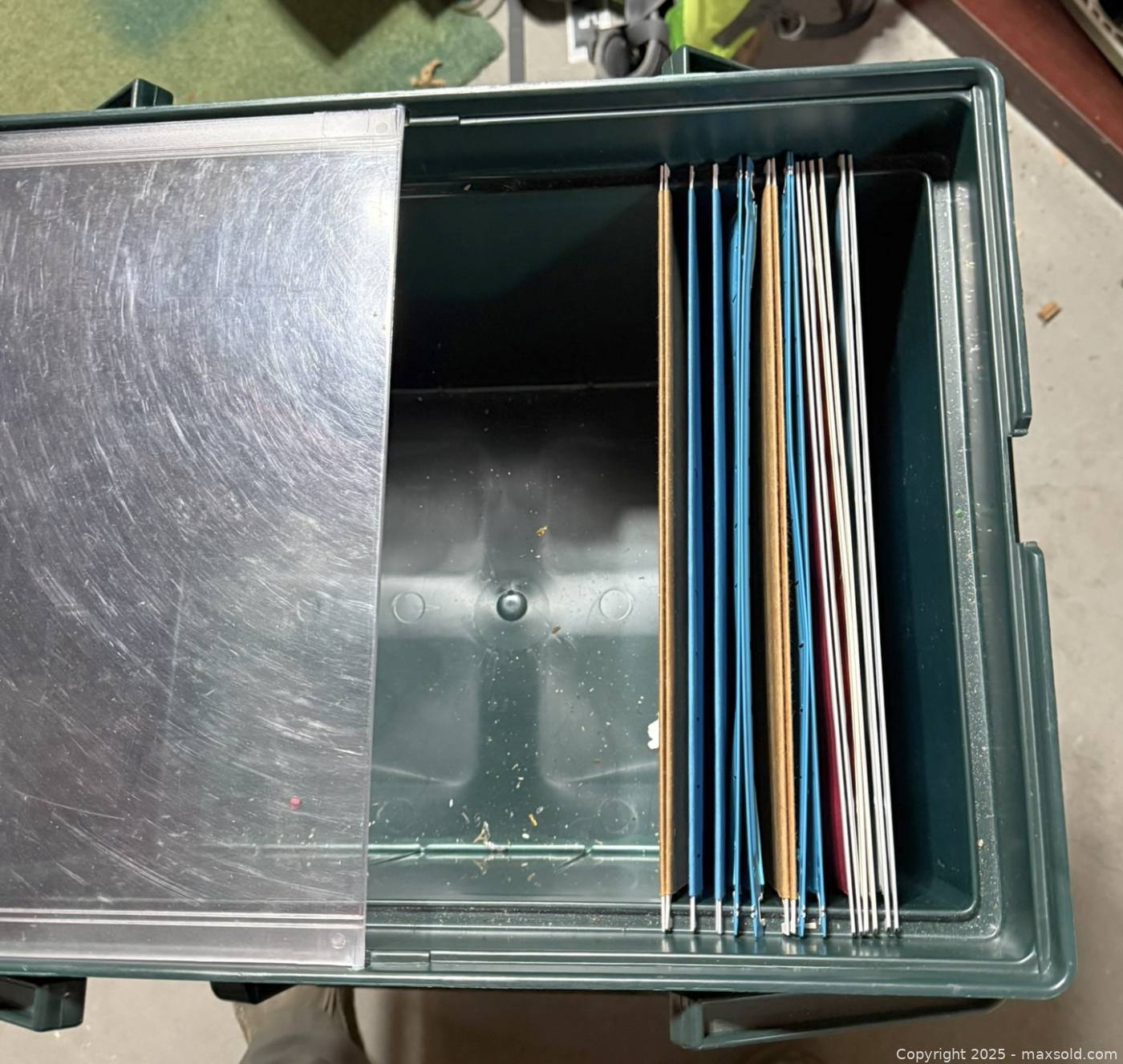Rolling plastic filing cabinet with folders | Maxsold