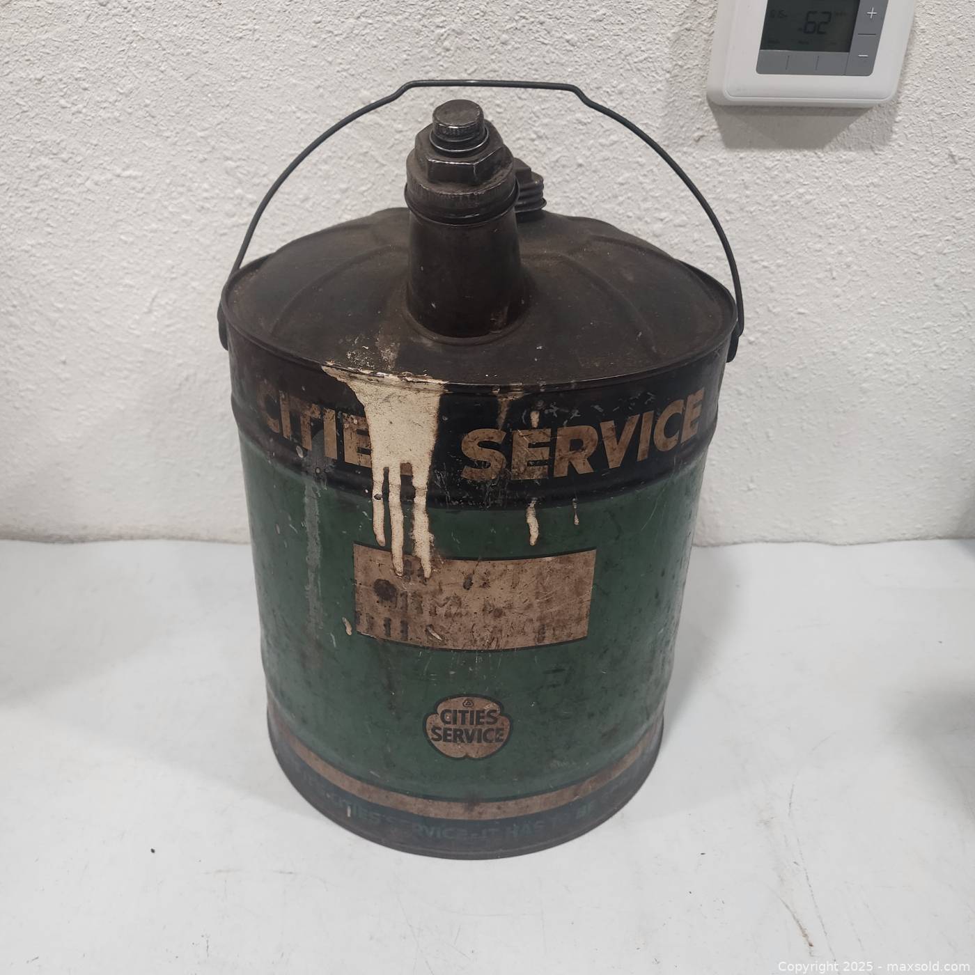 Vintage Cities Service metal oil can with lid | Maxsold