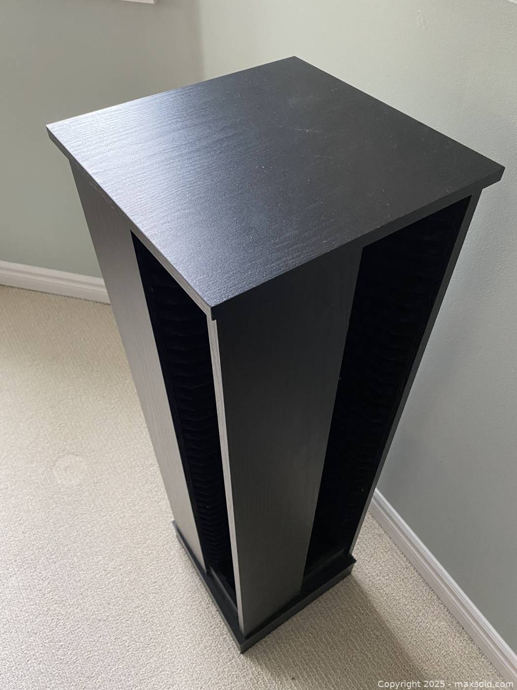 Rotating four-sided CD carousel tower | Maxsold