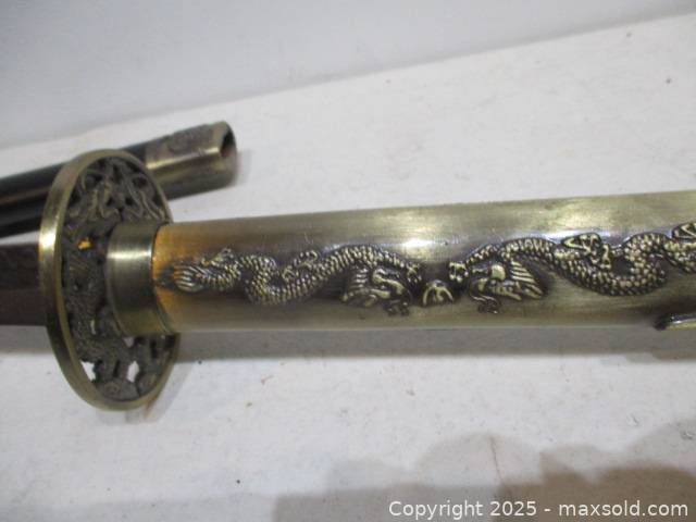 Ornate dragon-hilt samurai sword with scabbard | Maxsold