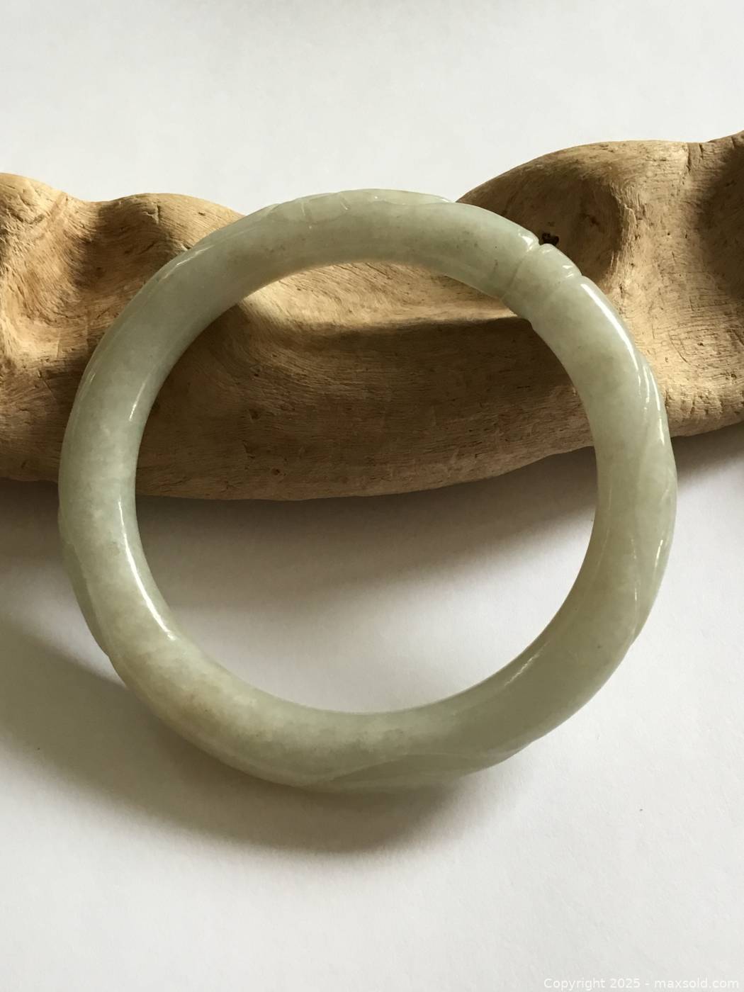Antique Chinese hand-carved jade bangle | Maxsold
