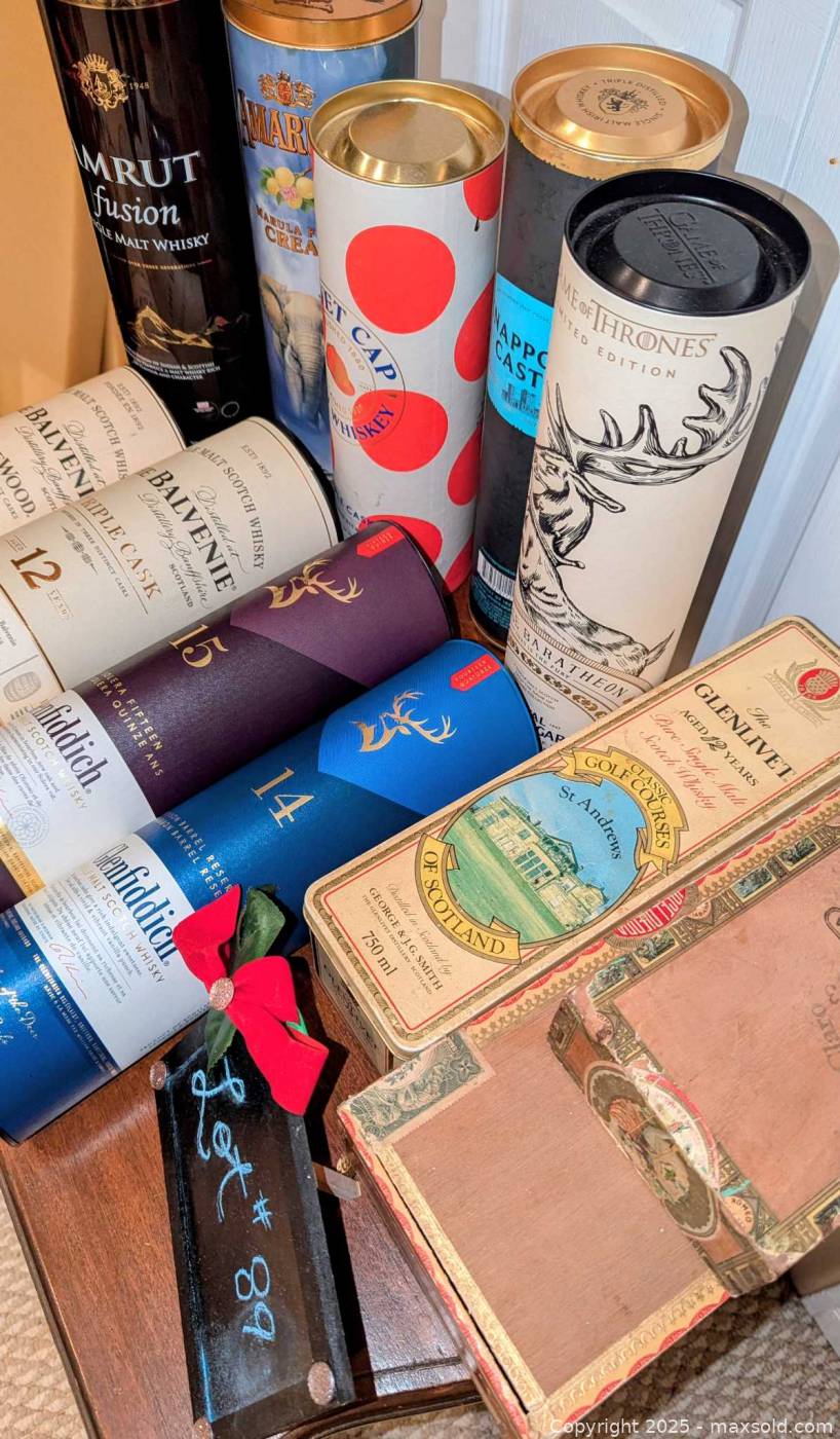 Empty whisky tubes & vintage cigar boxes | Maxsold