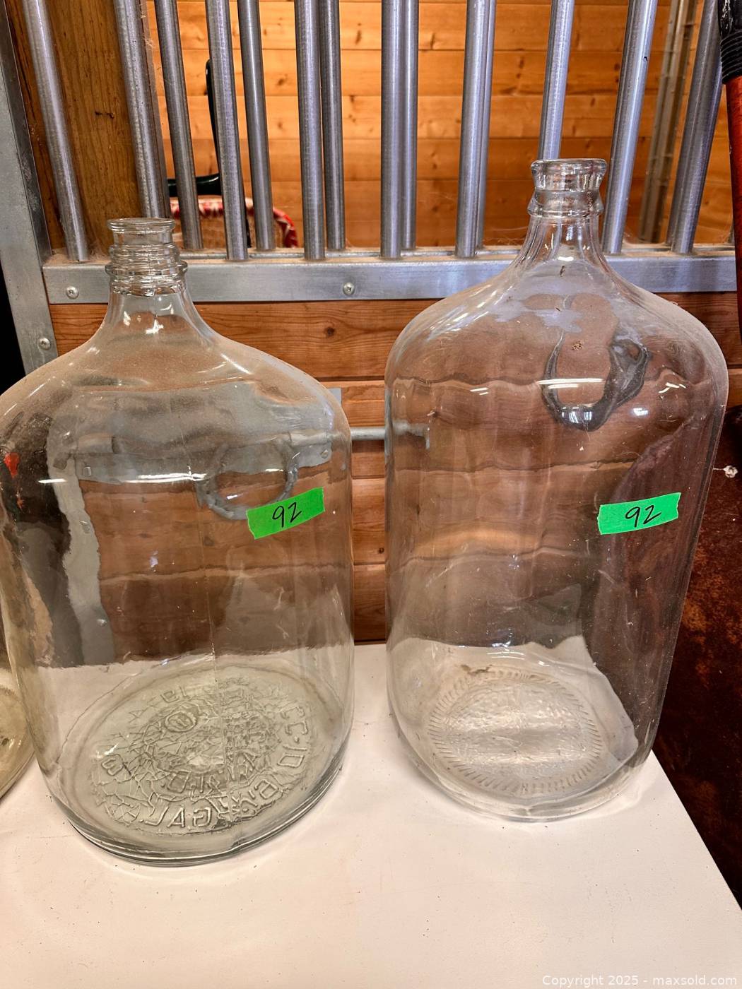 Four 6.5-gallon glass carboys | Maxsold