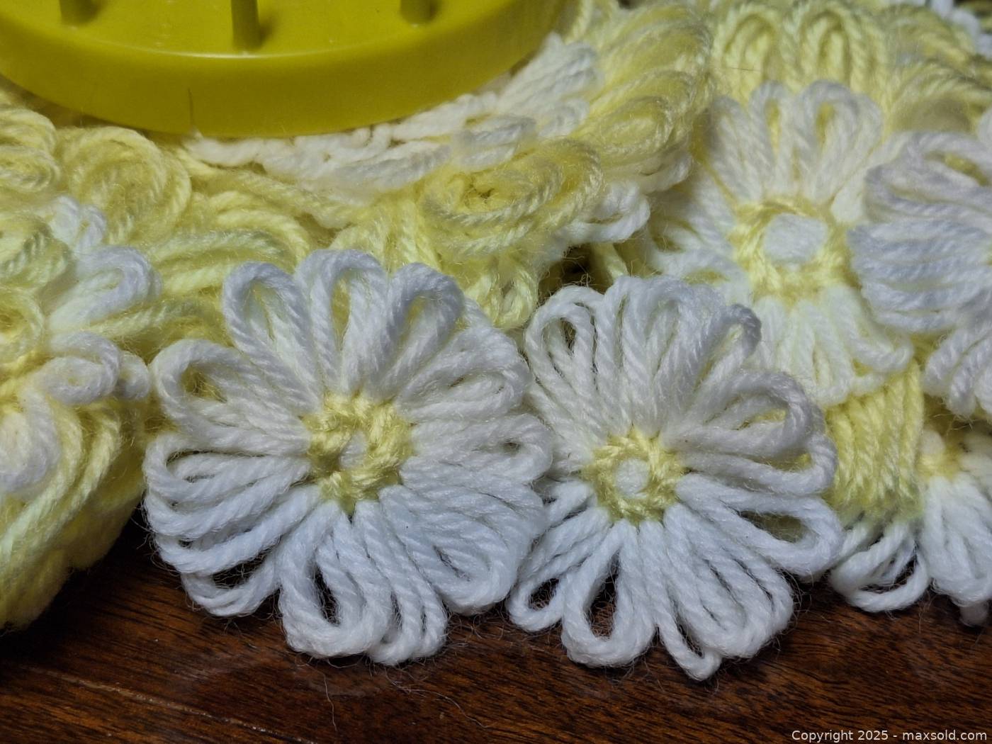 Flower knitting loom with yarn flowers | Maxsold