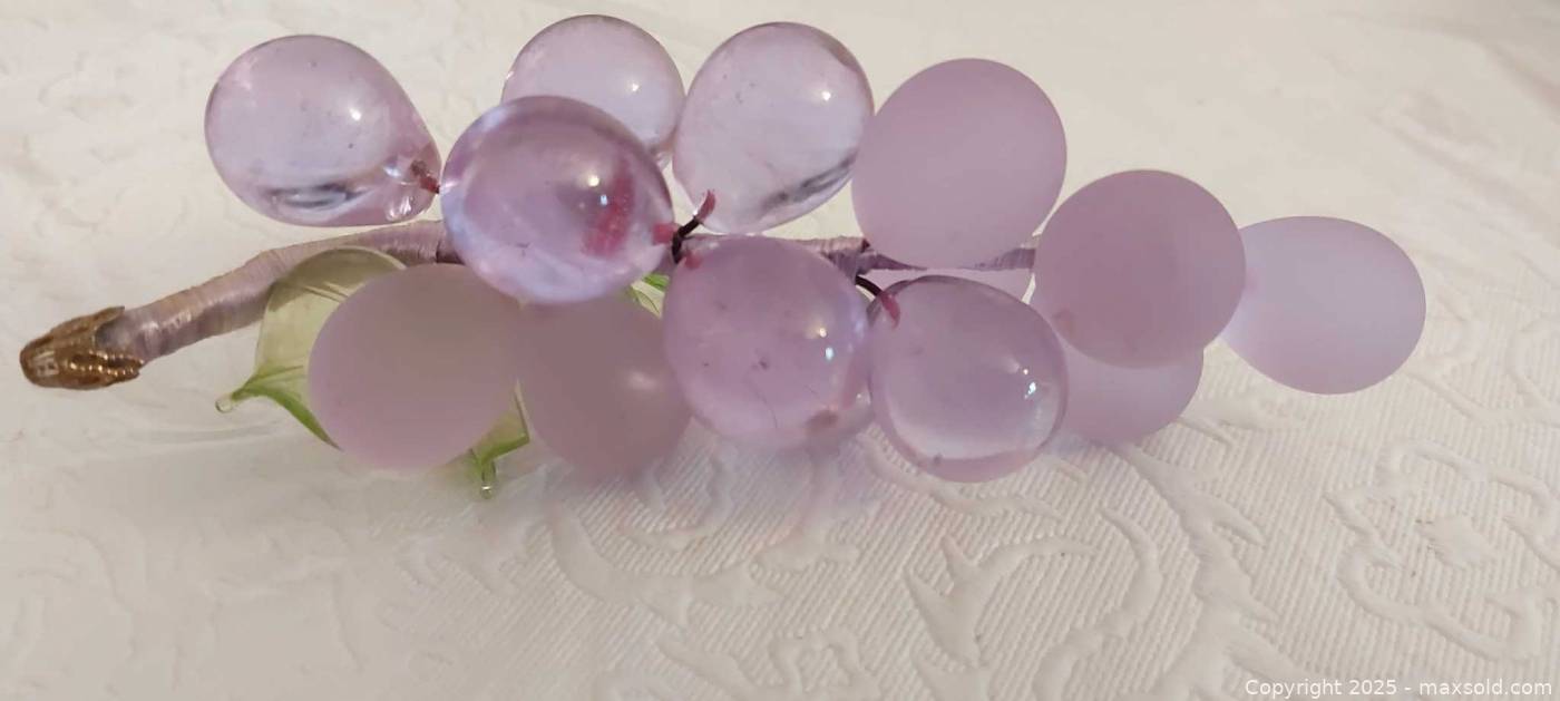 Ruby cut glass bowl and two glass grape clusters | Maxsold