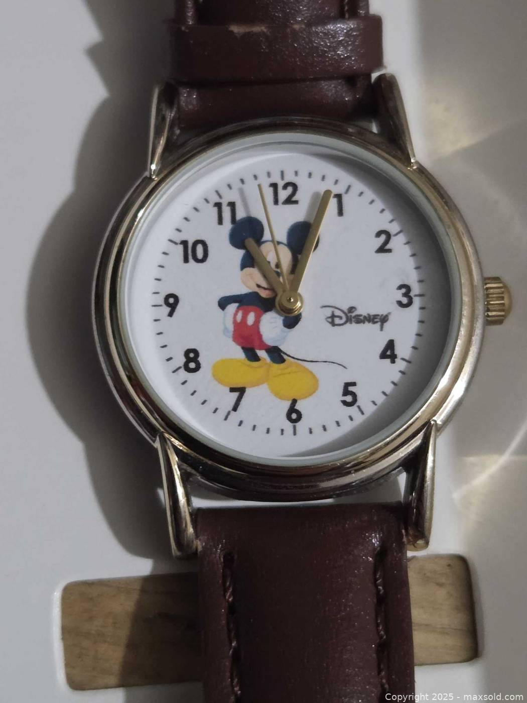Disney Mickey Mouse analog wristwatch with brown leather strap | Maxsold
