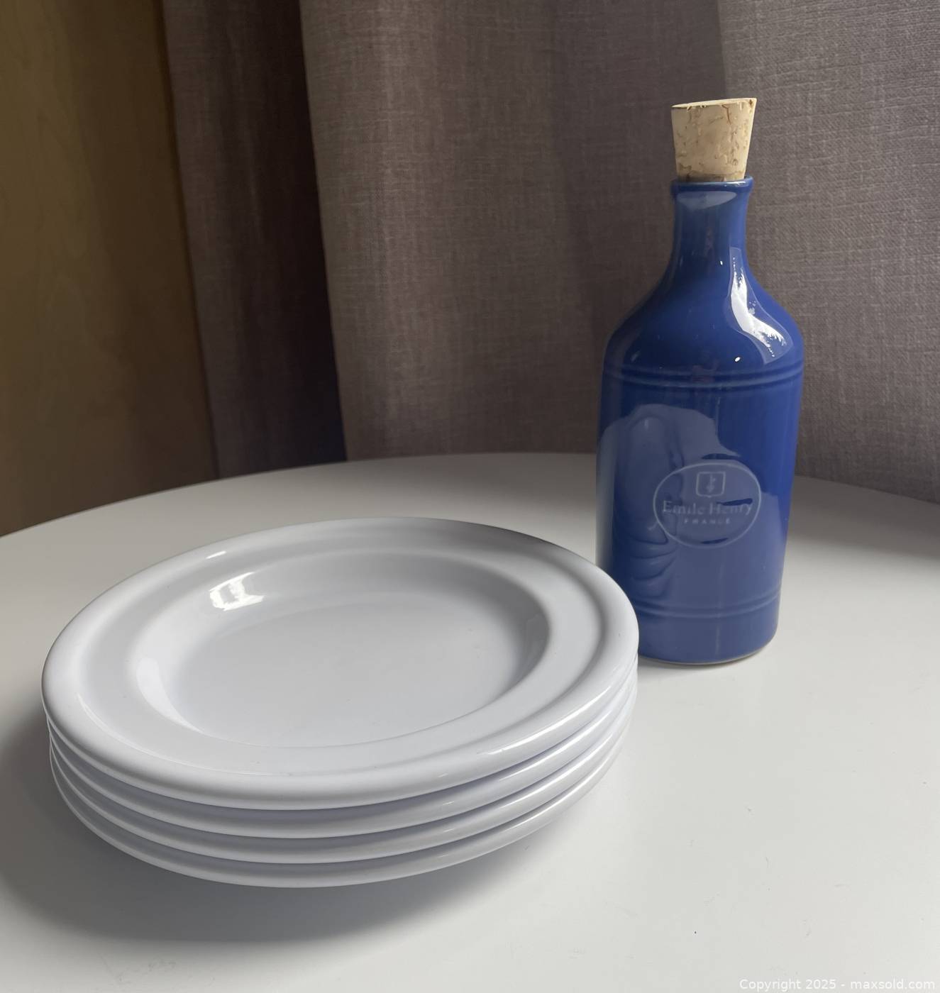 Emile Henry white side plates and oil decanter | Maxsold