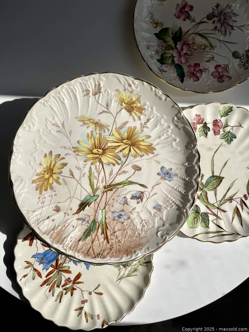Hancock & Sons floral plates and cake stand | Maxsold