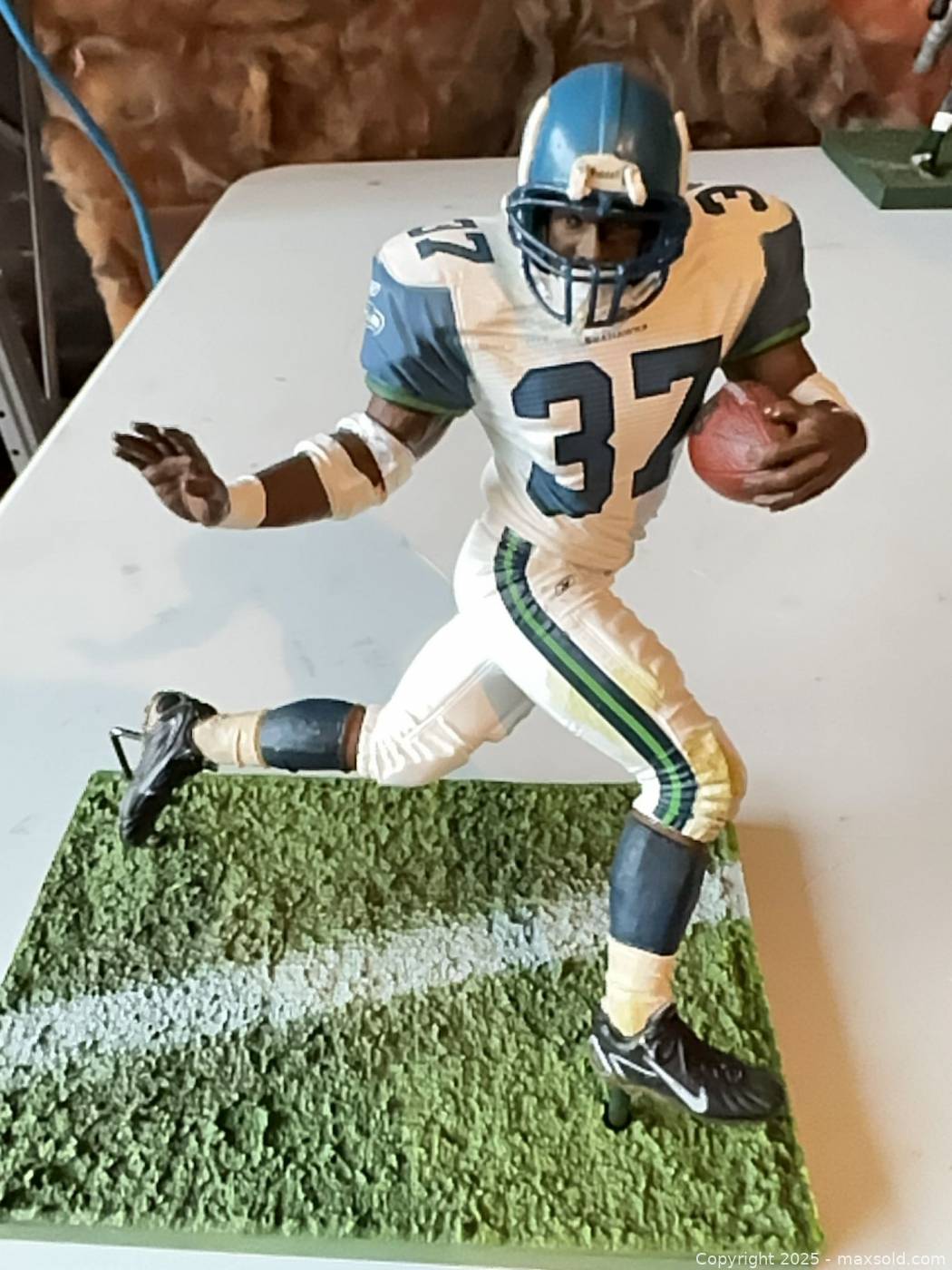 McFarlane Shaun Alexander Seattle Seahawks action figure | Maxsold
