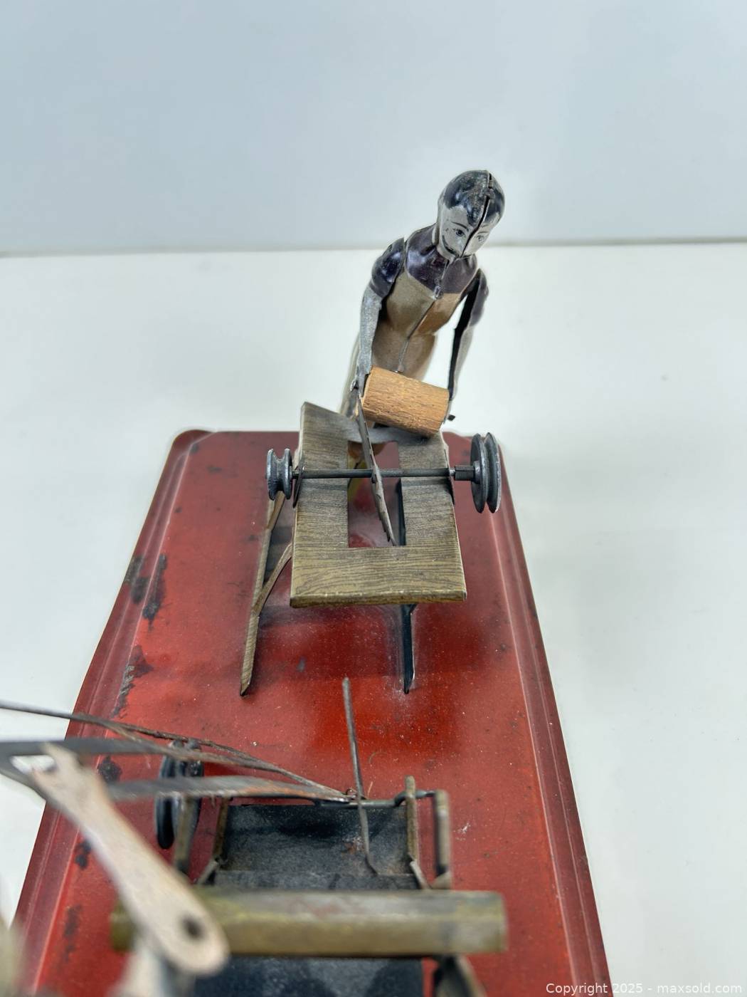 1930s mechanical tin lumber workshop toy | Maxsold