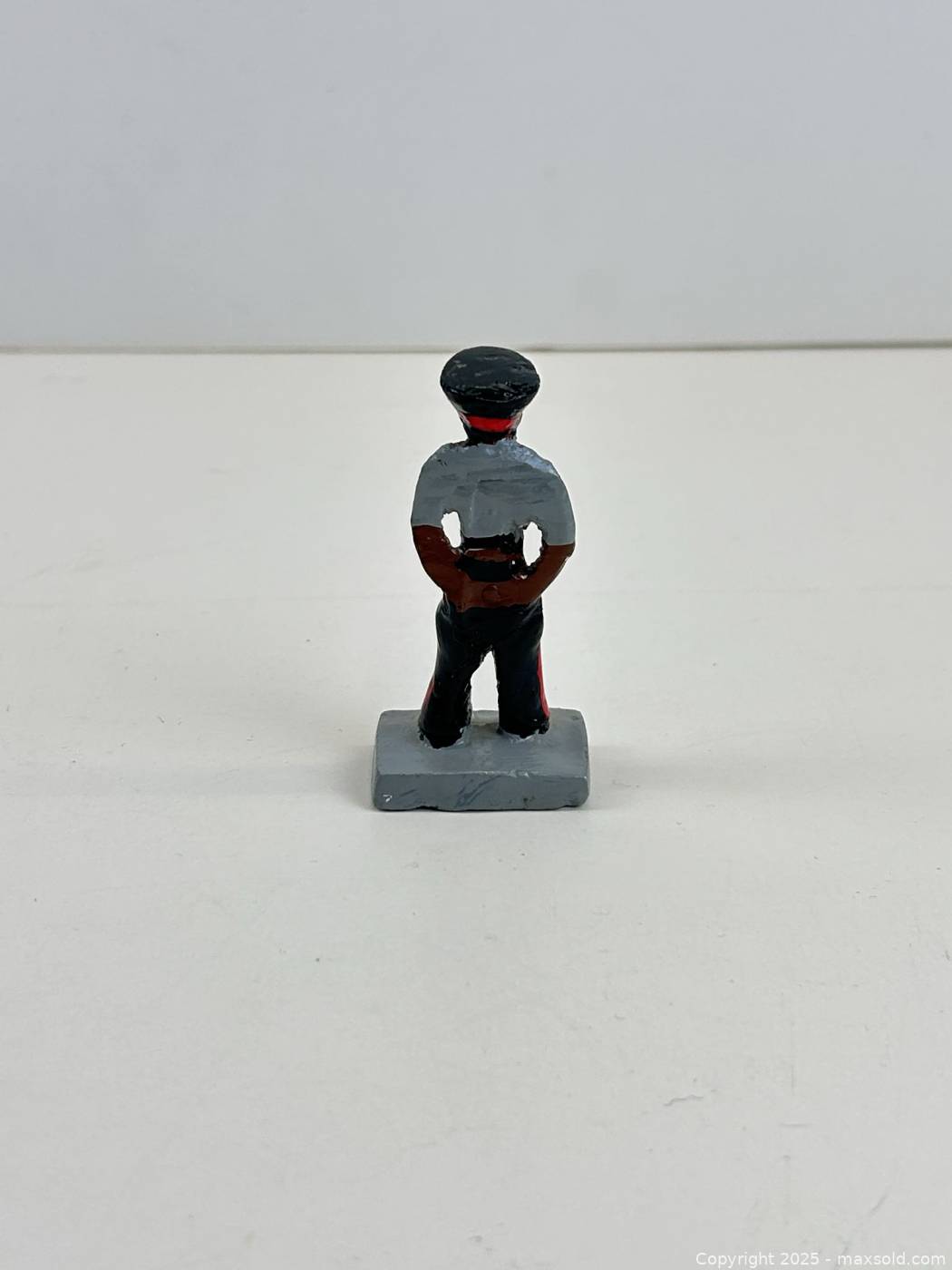 Vintage hand-painted officer figure and animal parade toy | Maxsold
