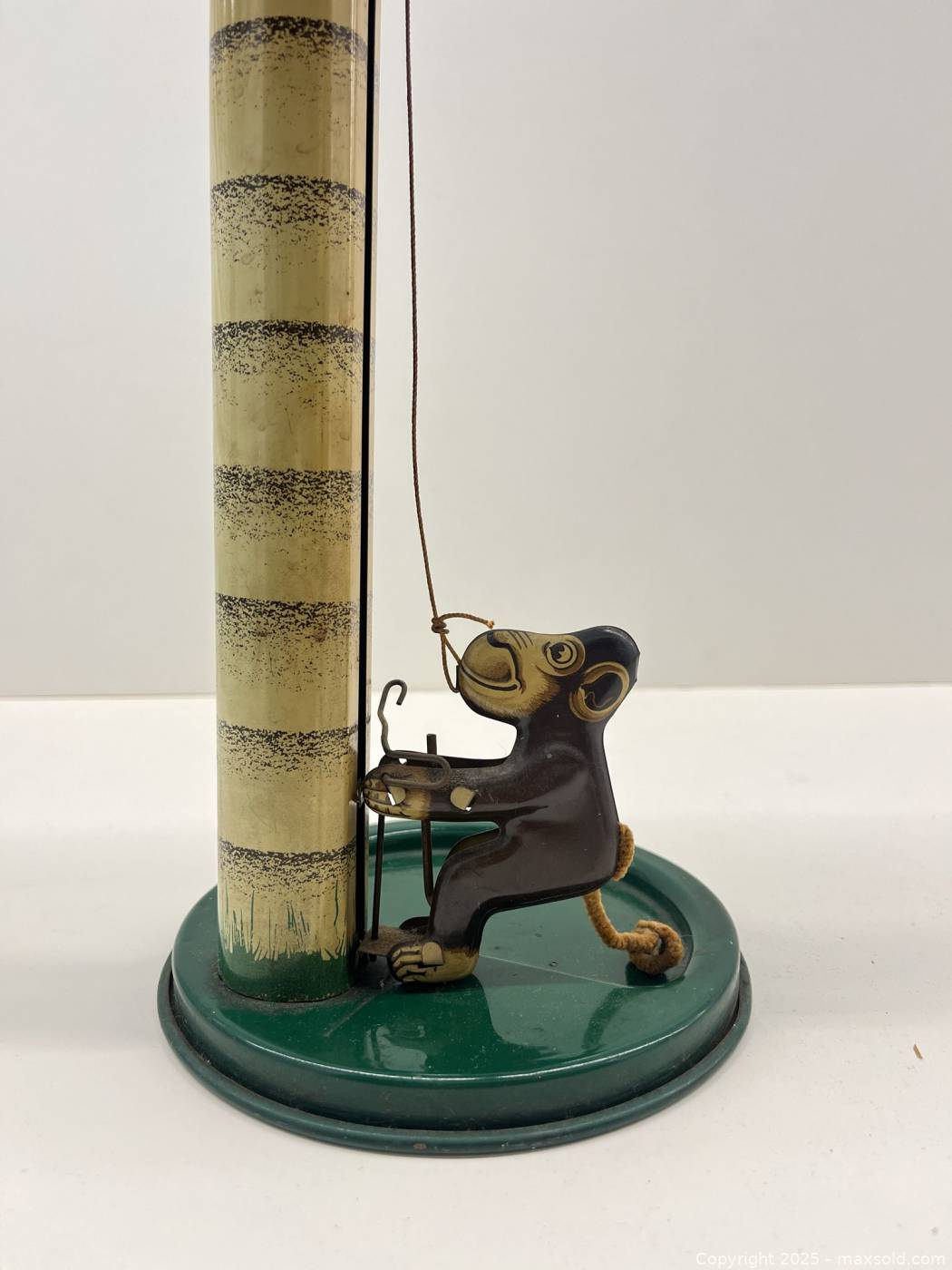Vintage litho tin monkey climbing palm tree toy | Maxsold