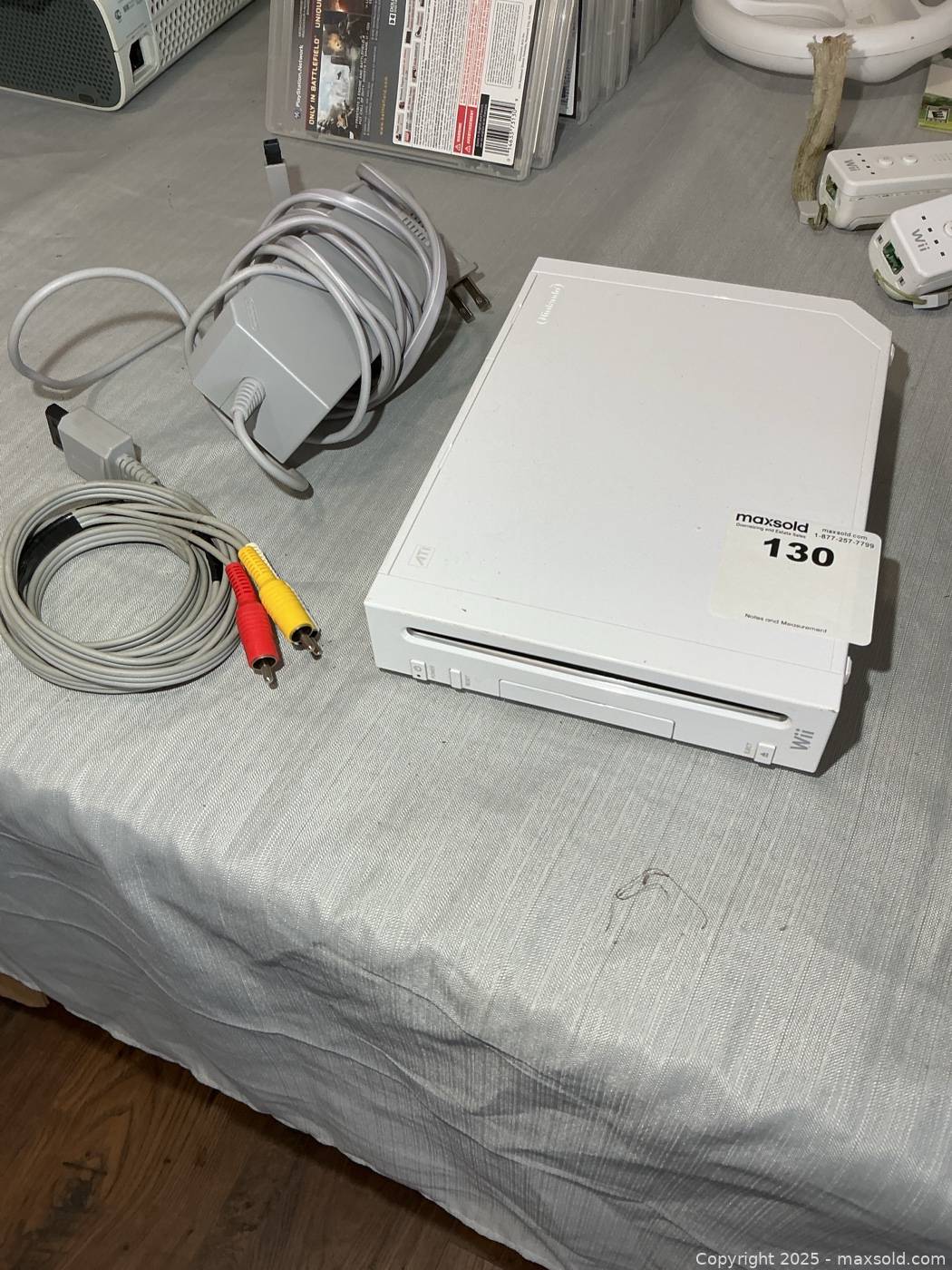 Nintendo Wii console with power and AV cables | Maxsold