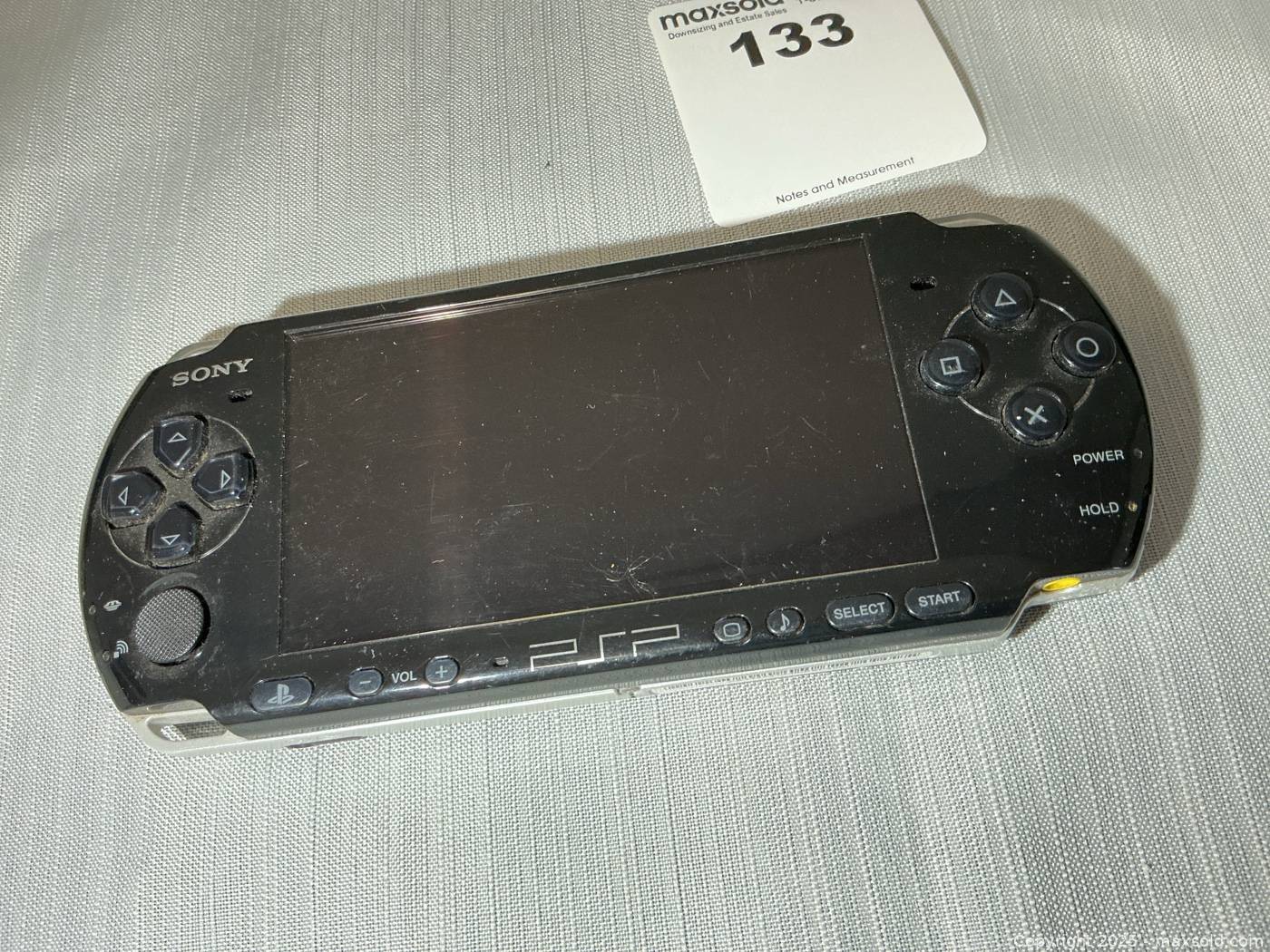 Sony PSP handheld gaming console | Maxsold