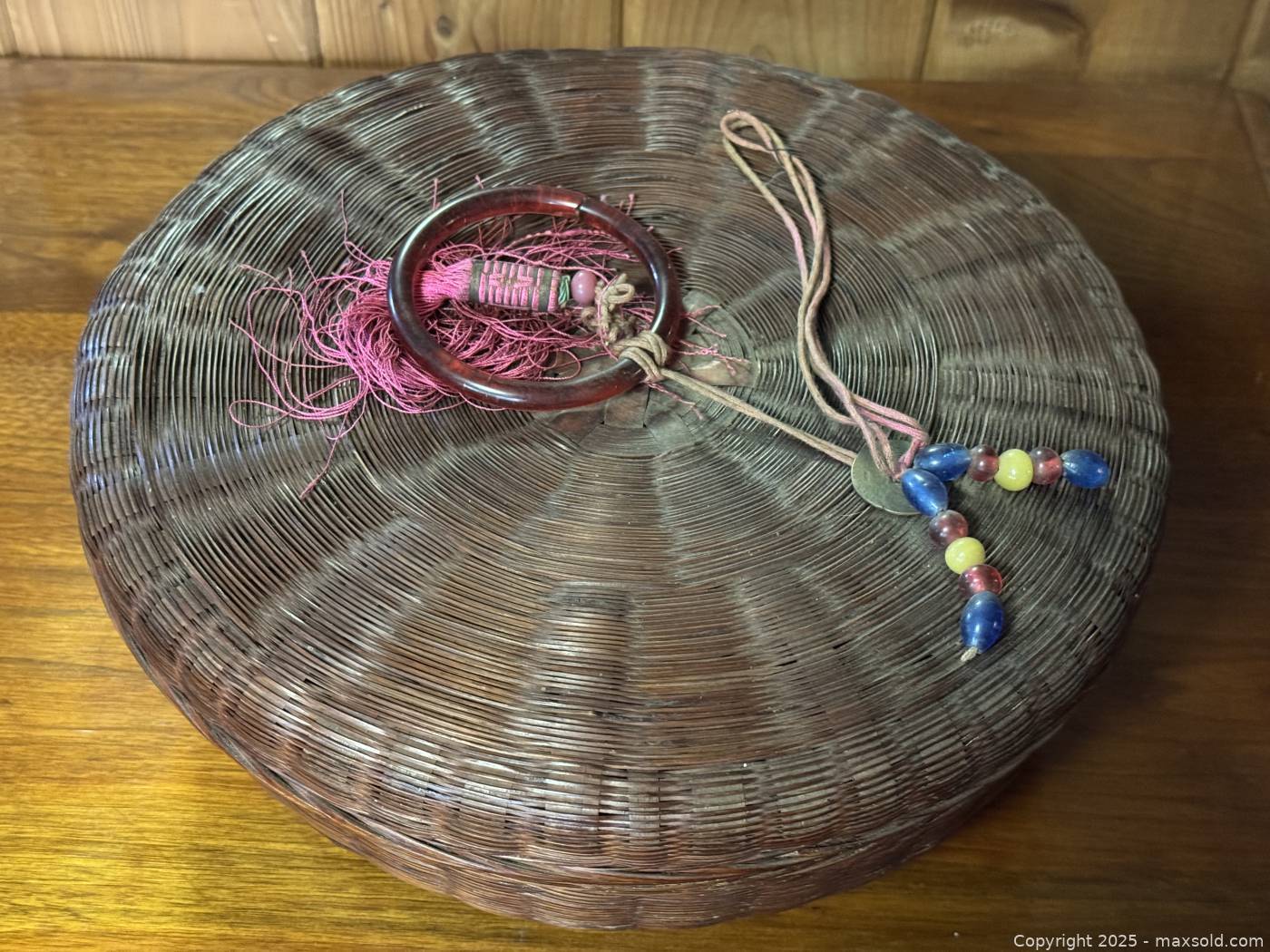 Wicker basket with assorted buttons and sewing notions | Maxsold