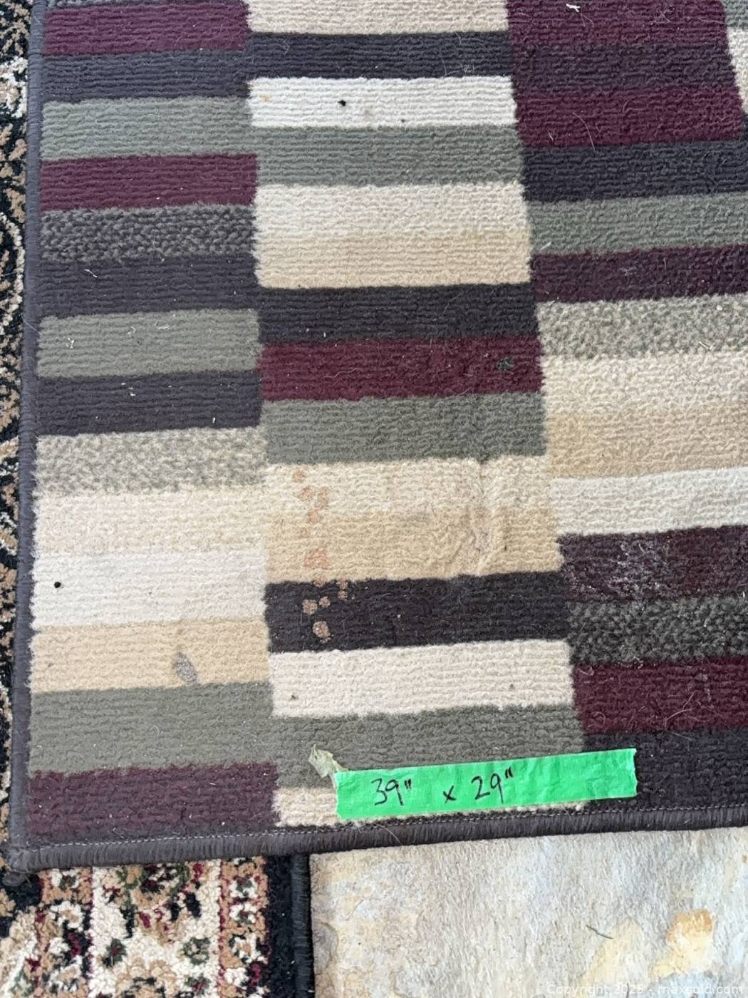 Two machine-made polypropylene rugs | Maxsold