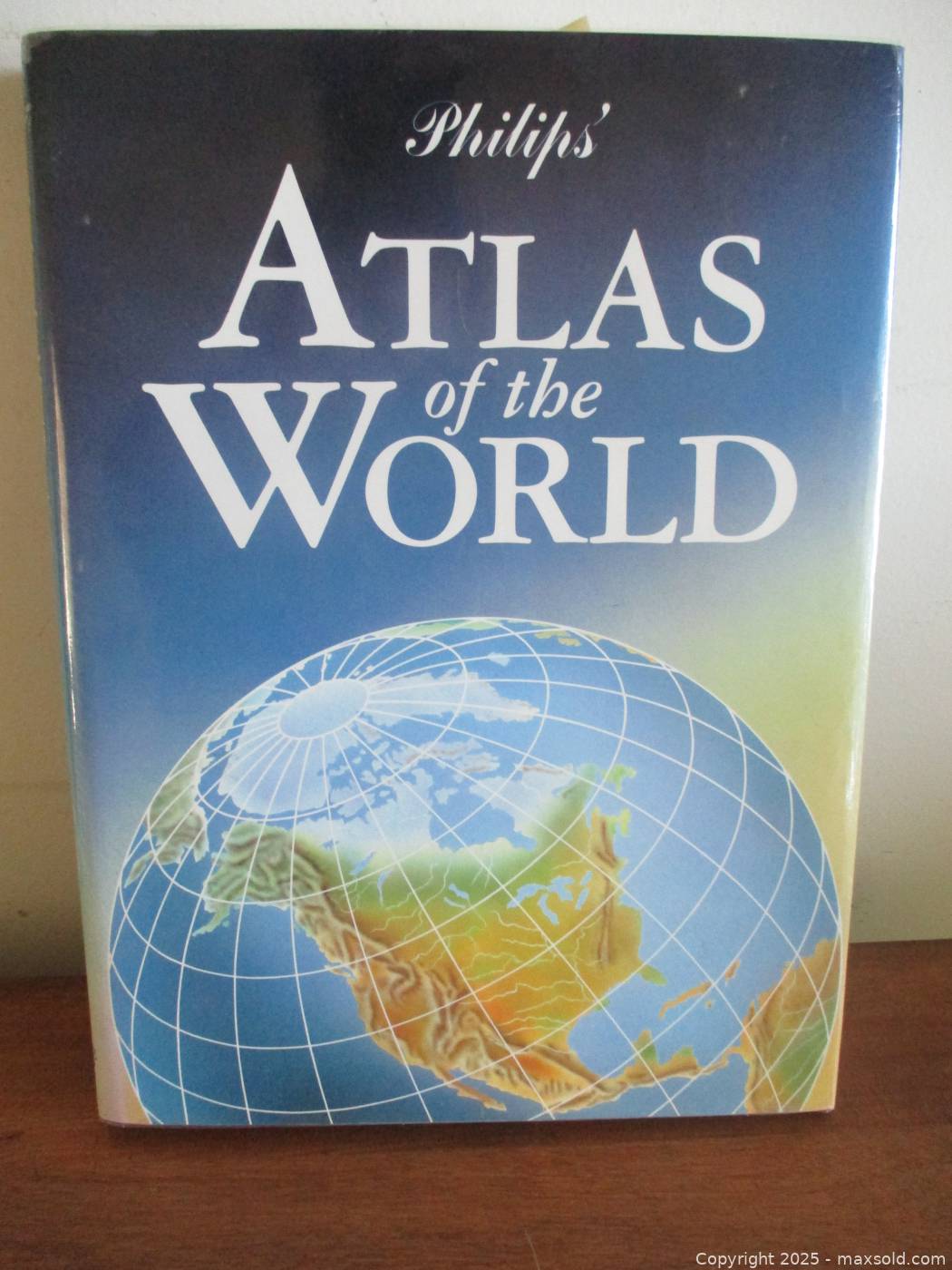 Philip's Atlas of the World and Stars & Planets Guide | Maxsold