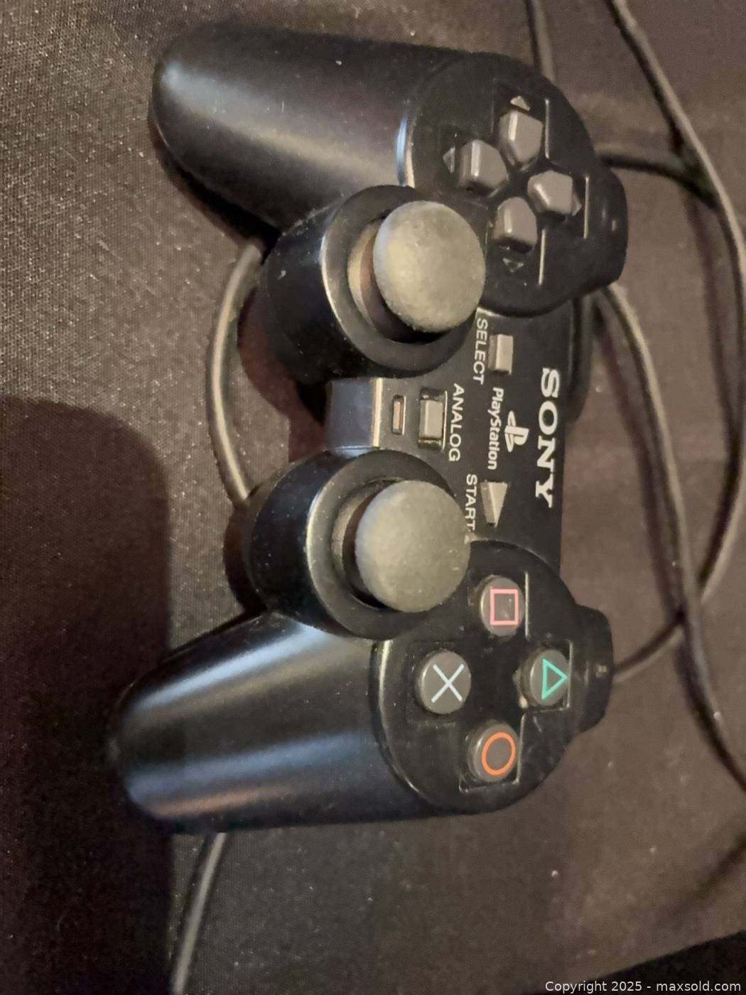 Sony PlayStation 2 console with wired controller | Maxsold