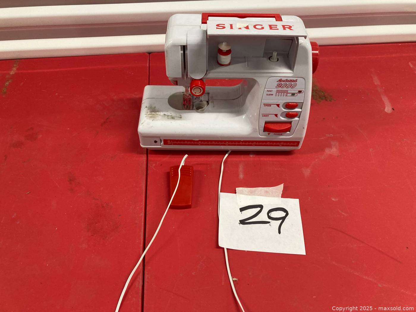 Singer Lockstitch 2000 Sewing Machine | Maxsold
