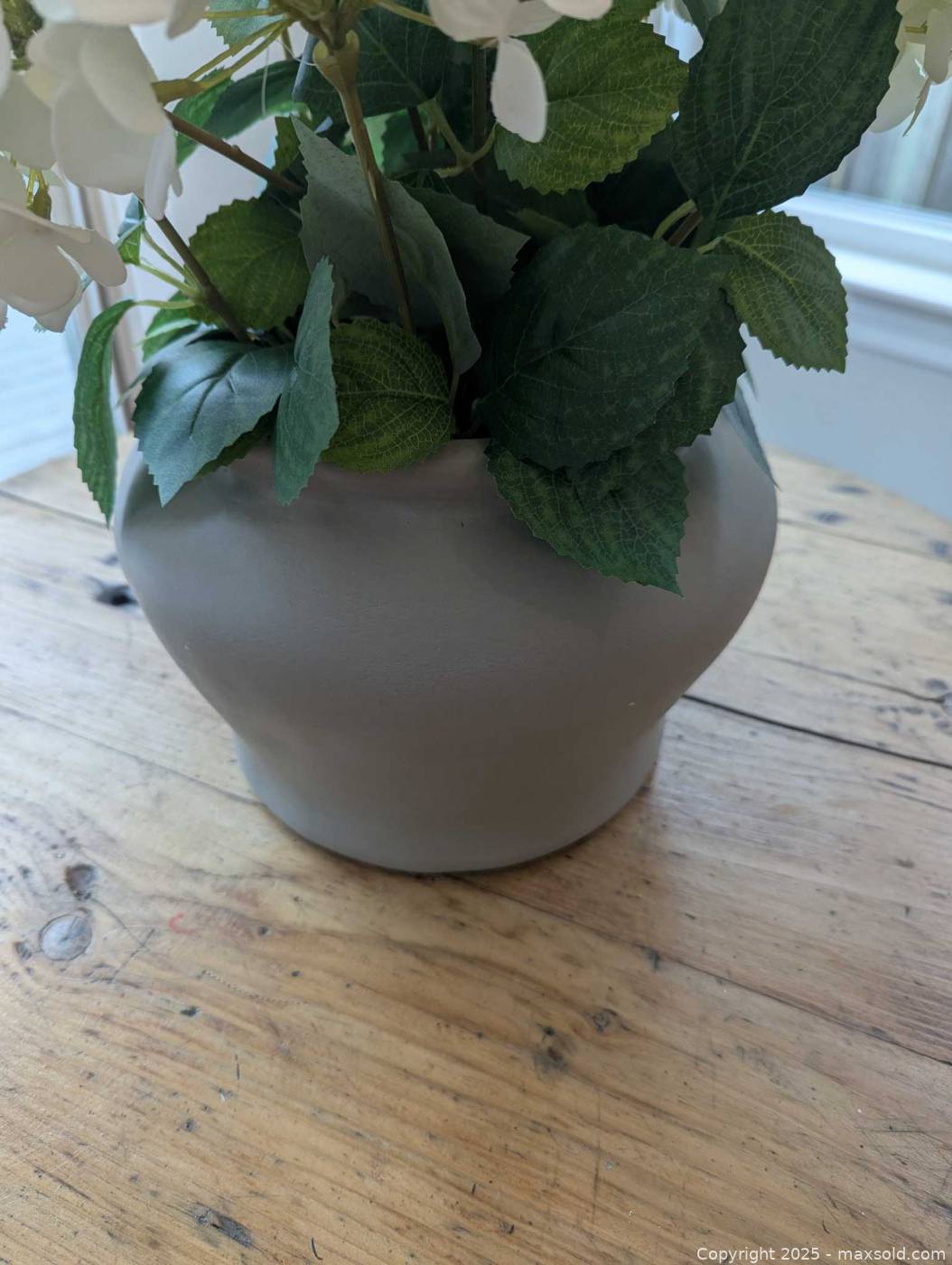 Grey ceramic vase with faux hydrangeas | Maxsold