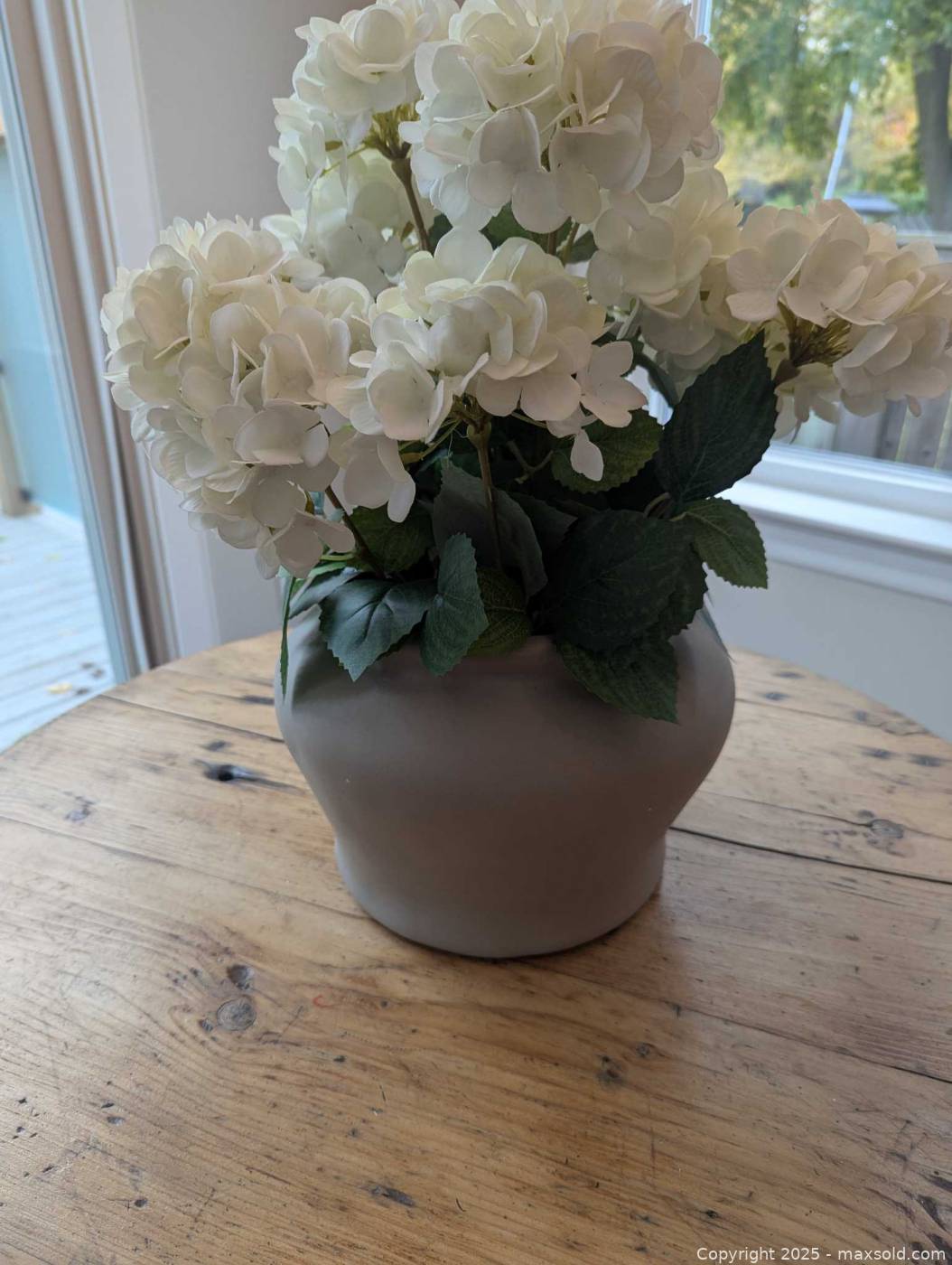 Grey ceramic vase with faux hydrangeas | Maxsold