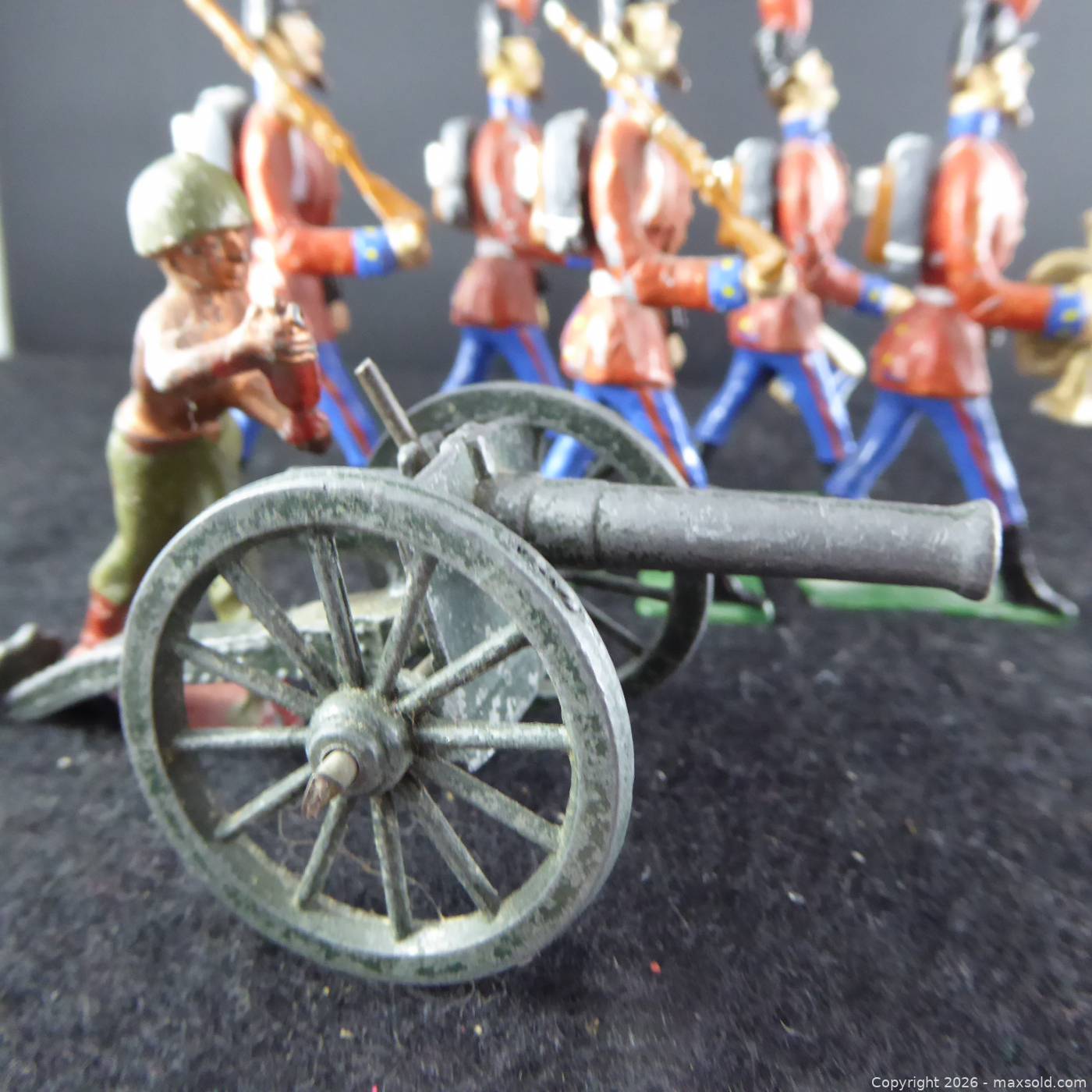 Vintage painted metal toy soldiers with cannon, 8 pcs | Maxsold