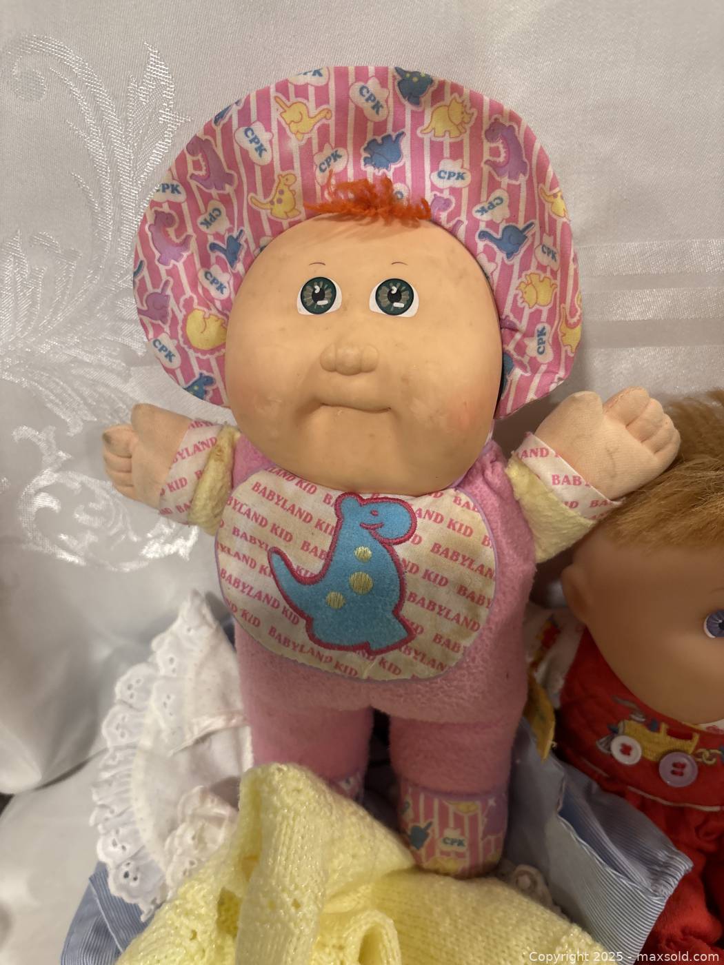 Three vintage Cabbage Patch Kid dolls with doll clothing | Maxsold
