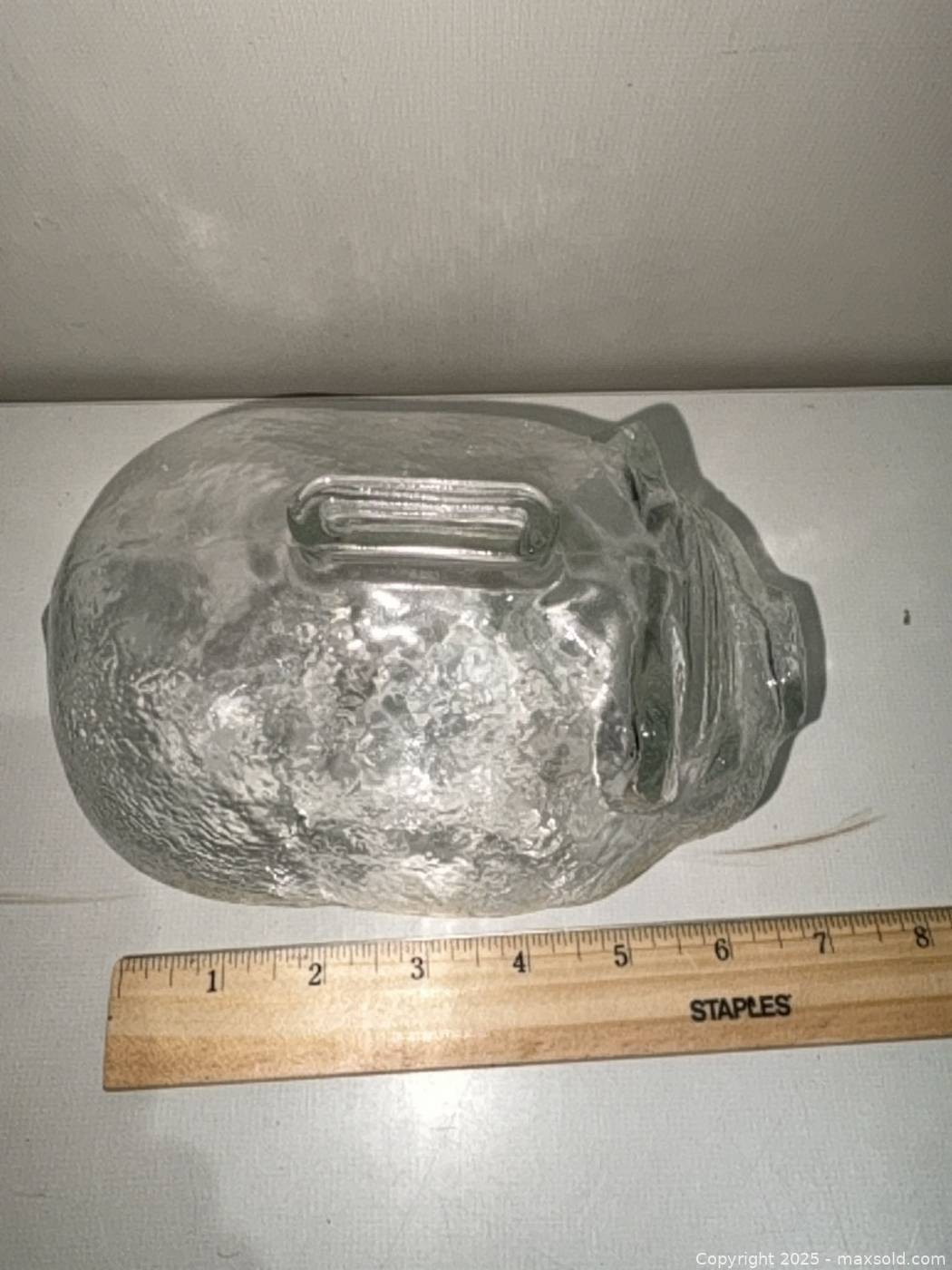 Glass bacon press and 4 Anchor Hocking piggy banks | Maxsold