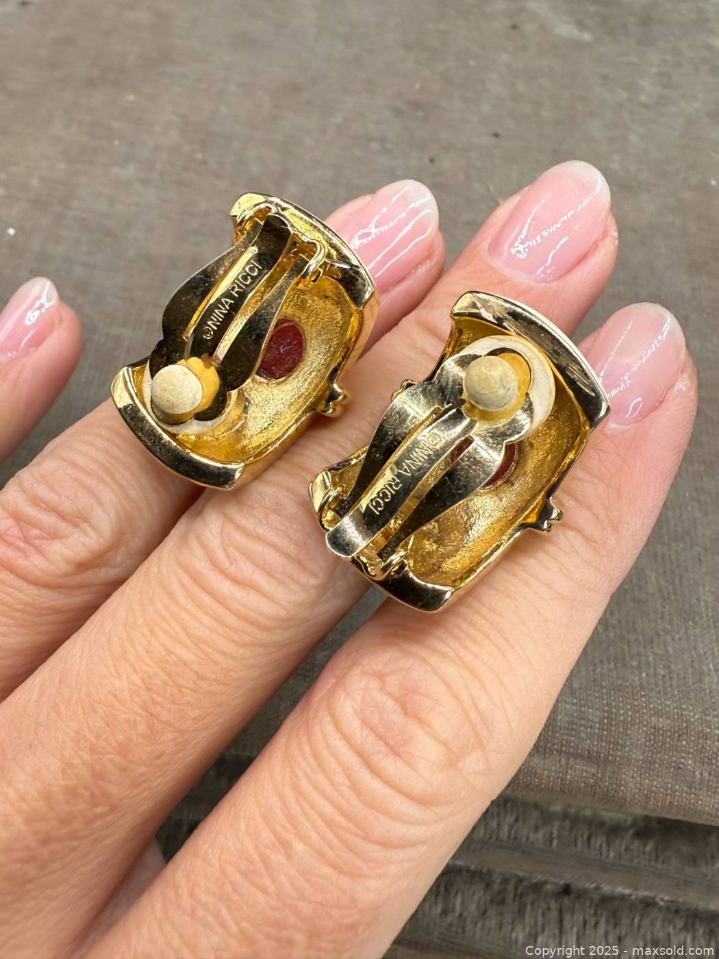 Nina Ricci vintage gold-tone clip-on earrings | Maxsold