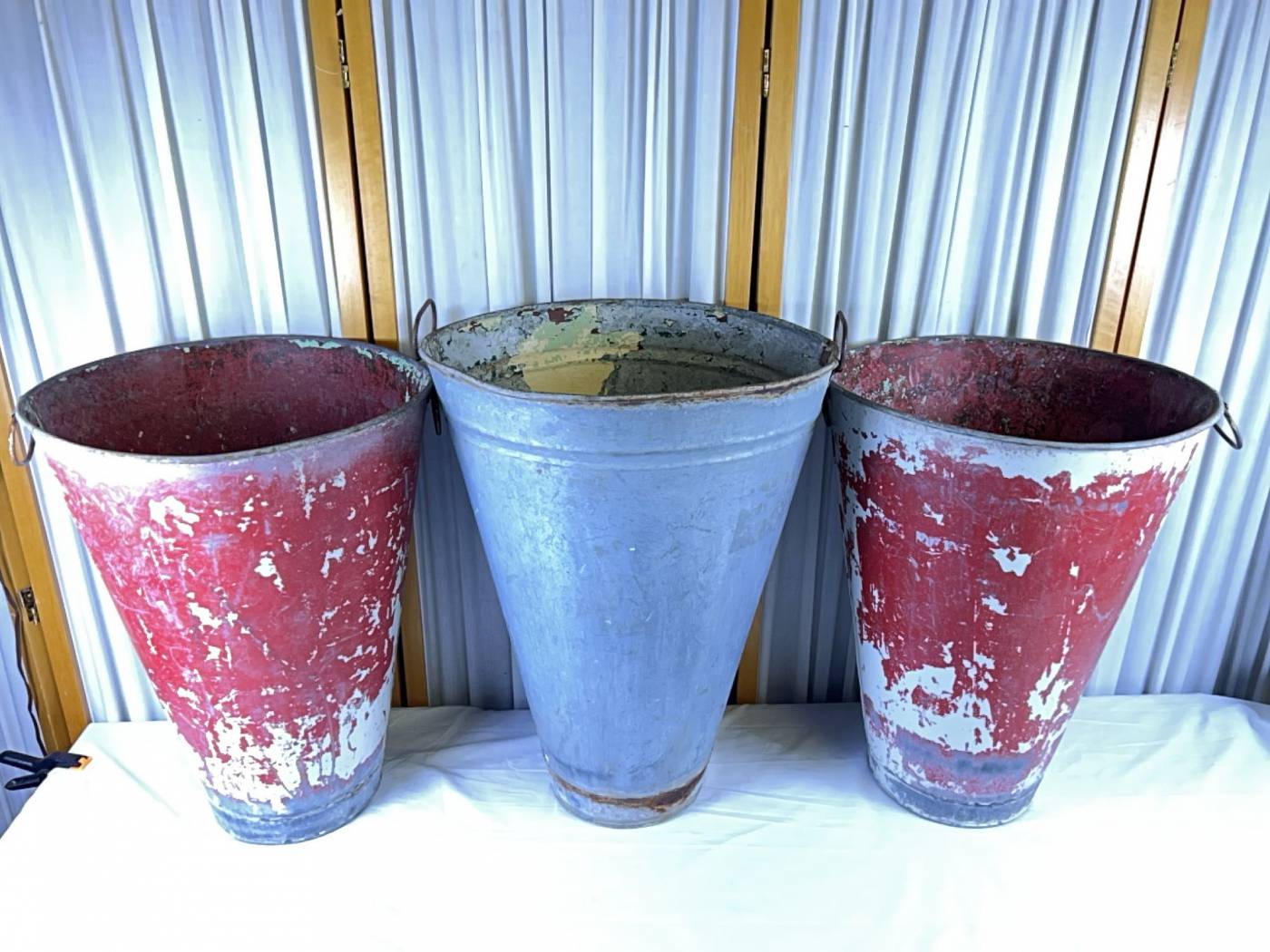 Large tapered red metal bucket 22x16 in | Maxsold