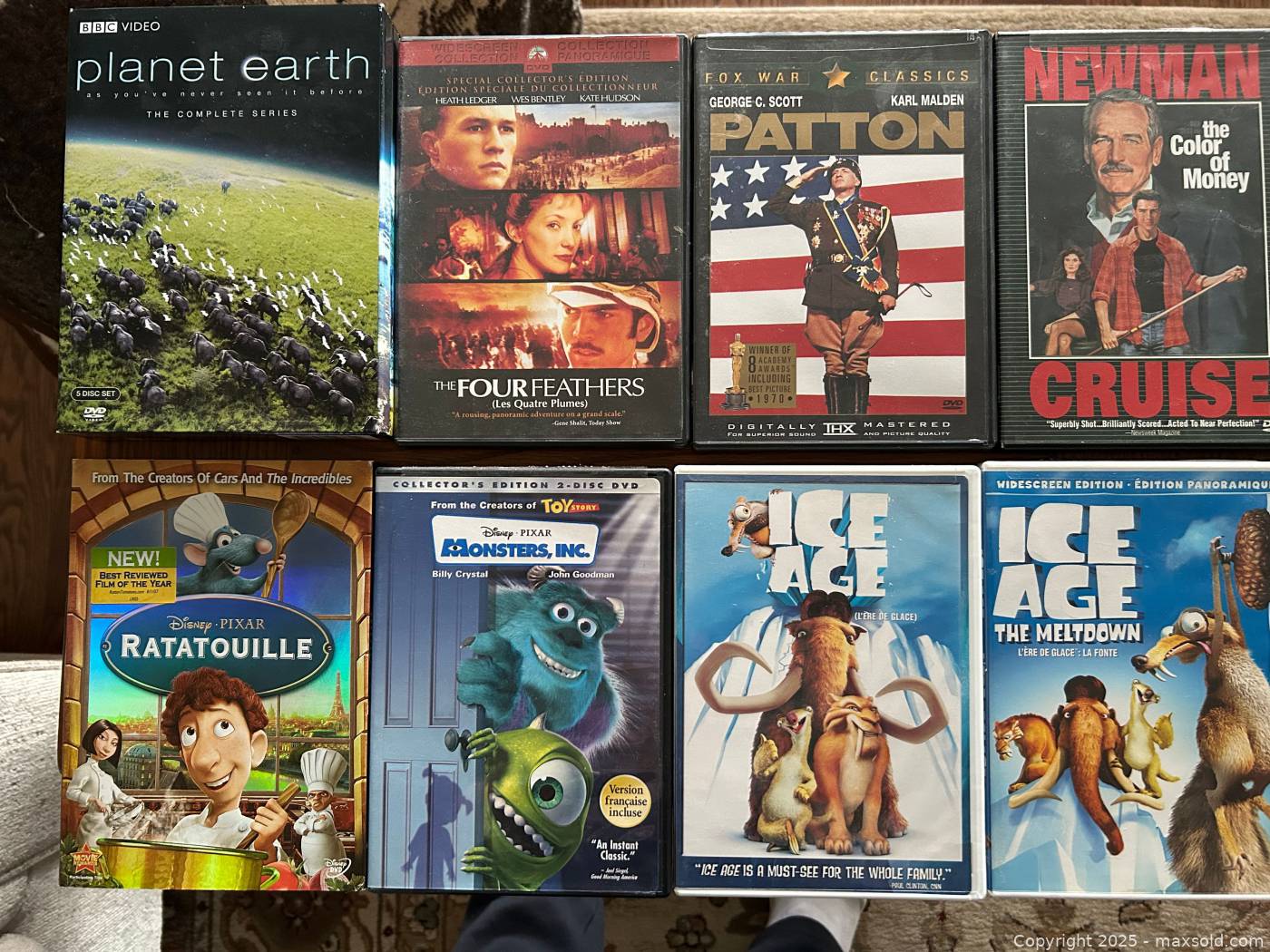 Planet Earth 5-DVD set with 7 movie DVDs | Maxsold