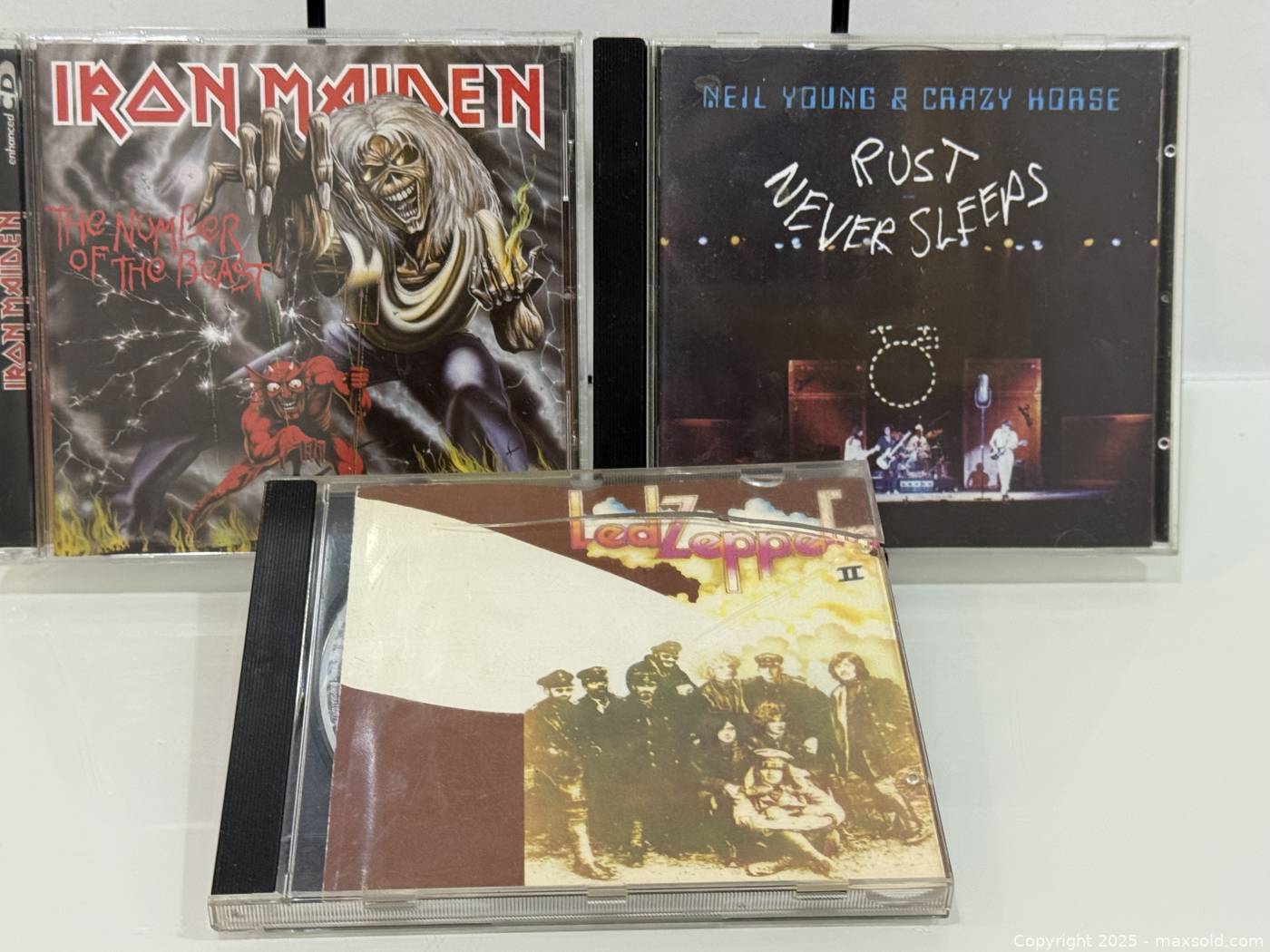 Iron Maiden, Neil Young, Led Zeppelin CDs | Maxsold