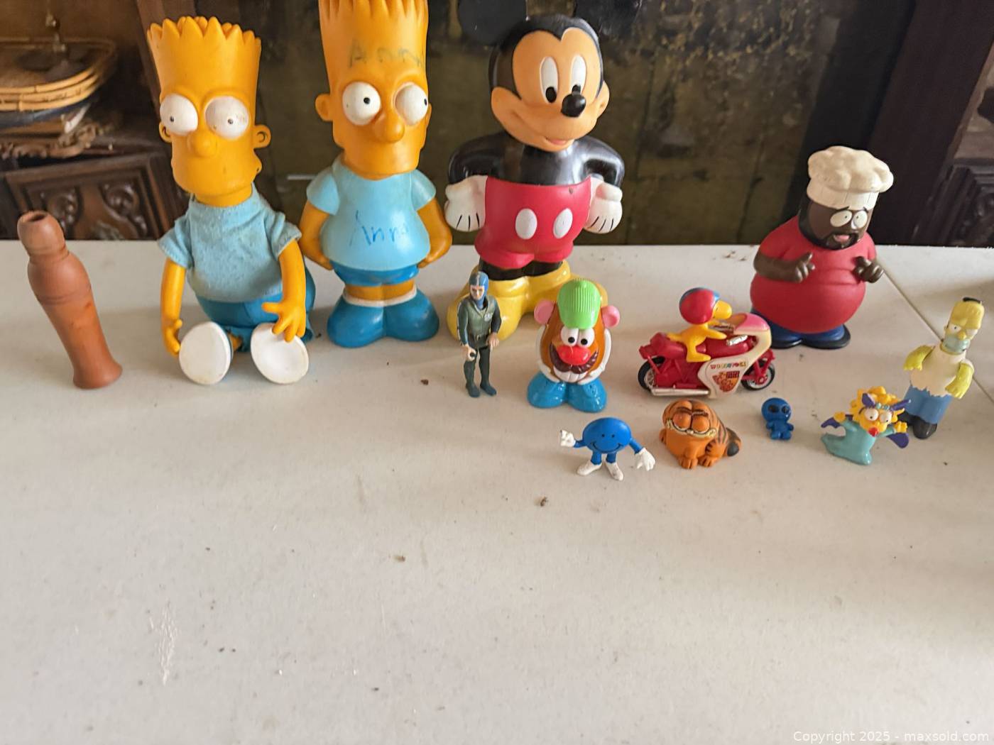 Lot of 12 Small Toy Figures — Simpsons, Garfield, Mickey | Maxsold