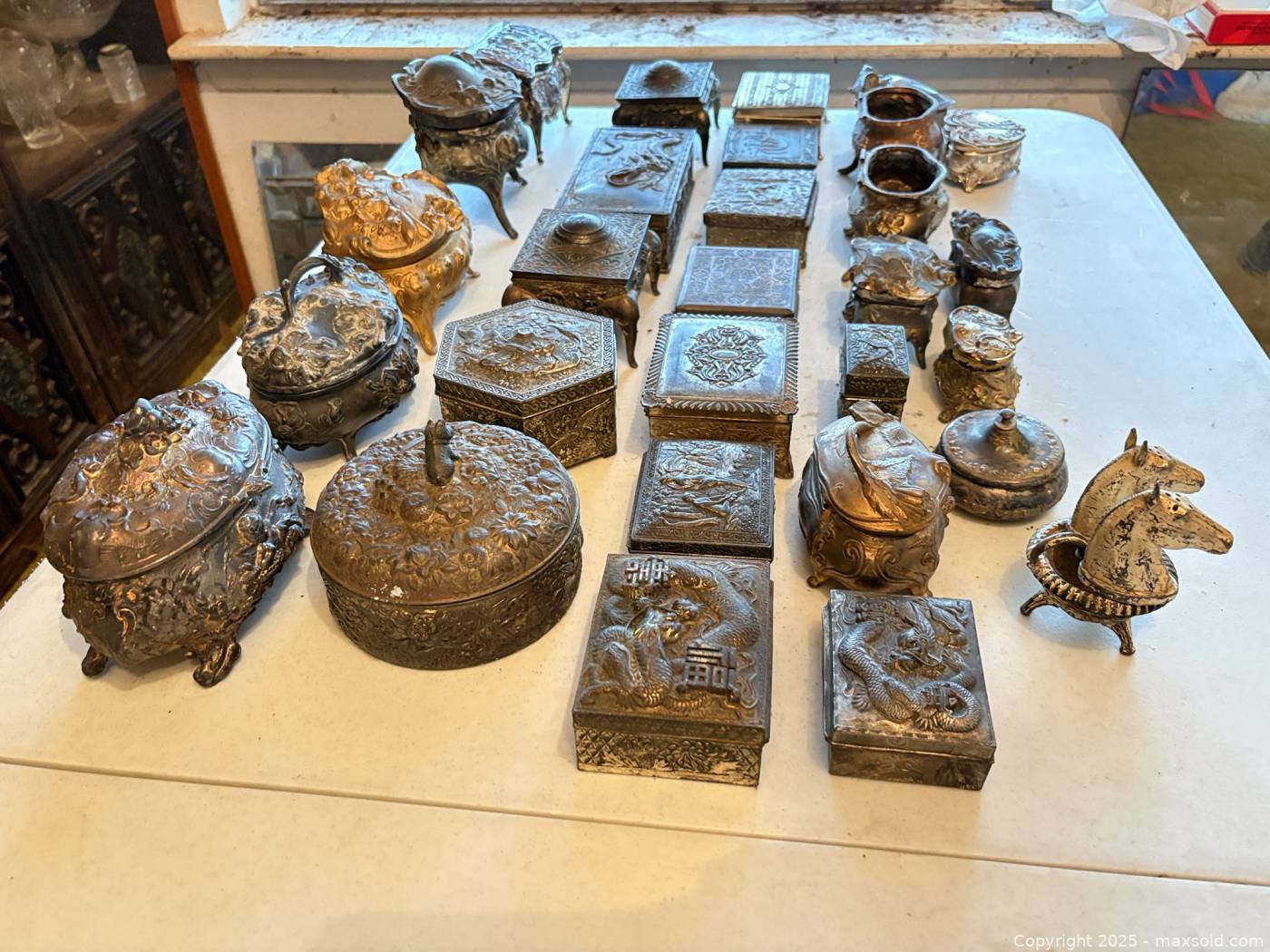 25 vintage metal trinket boxes & small figures | Maxsold