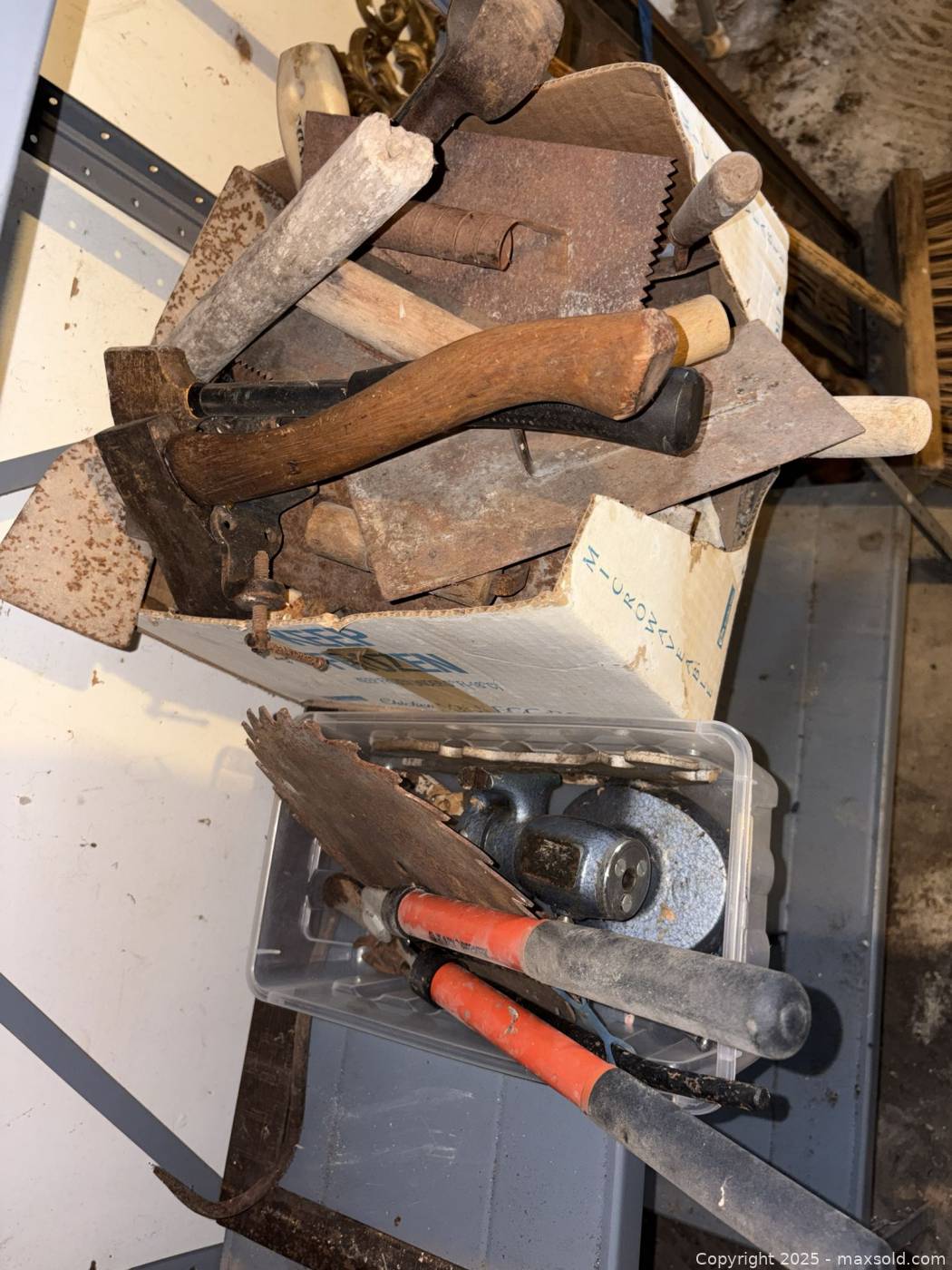 Mixed rusted hand tools hatchets loppers saws | Maxsold