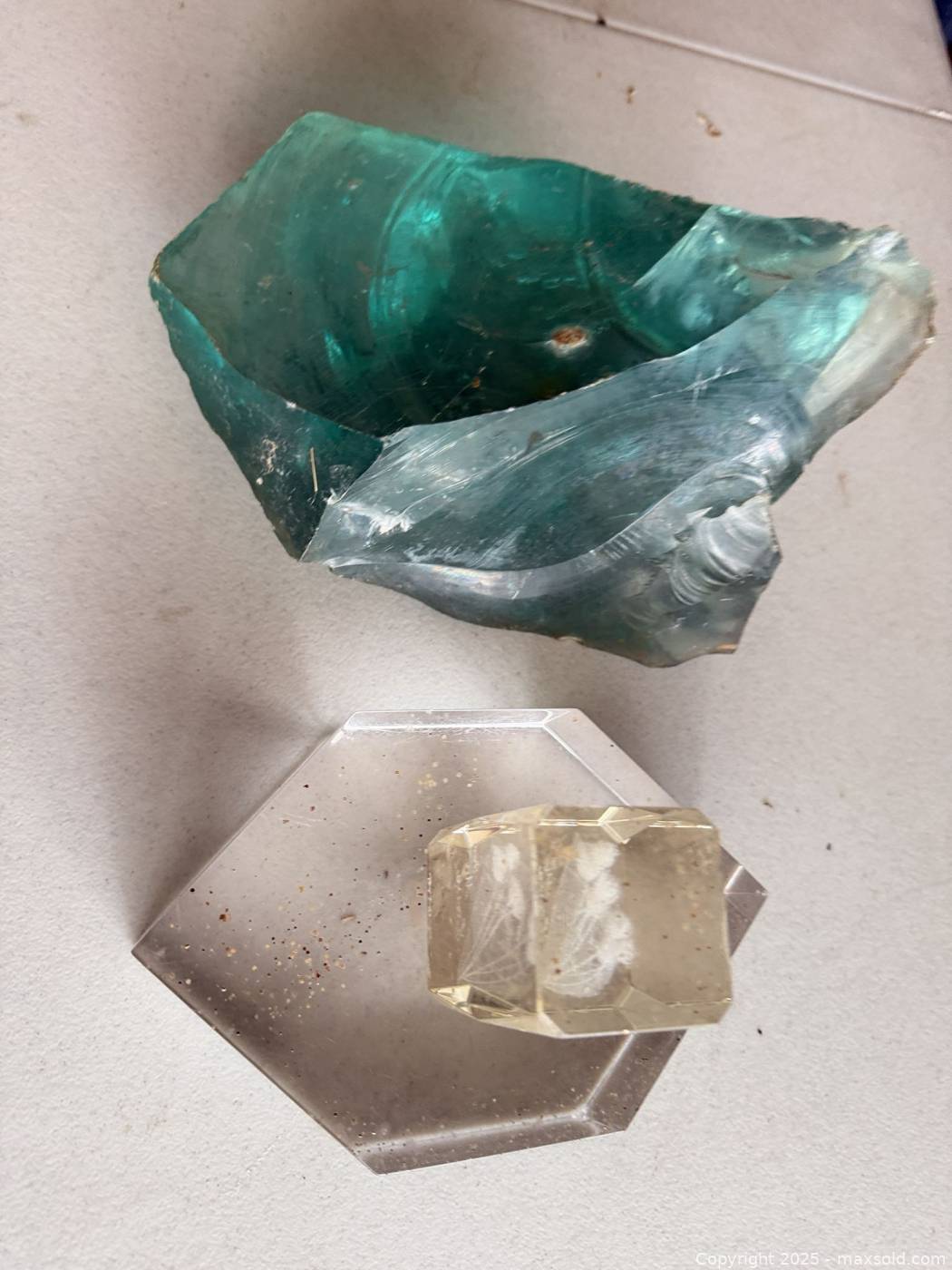 Aqua slag glass chunk and yellow crystal cube with acrylic base | Maxsold