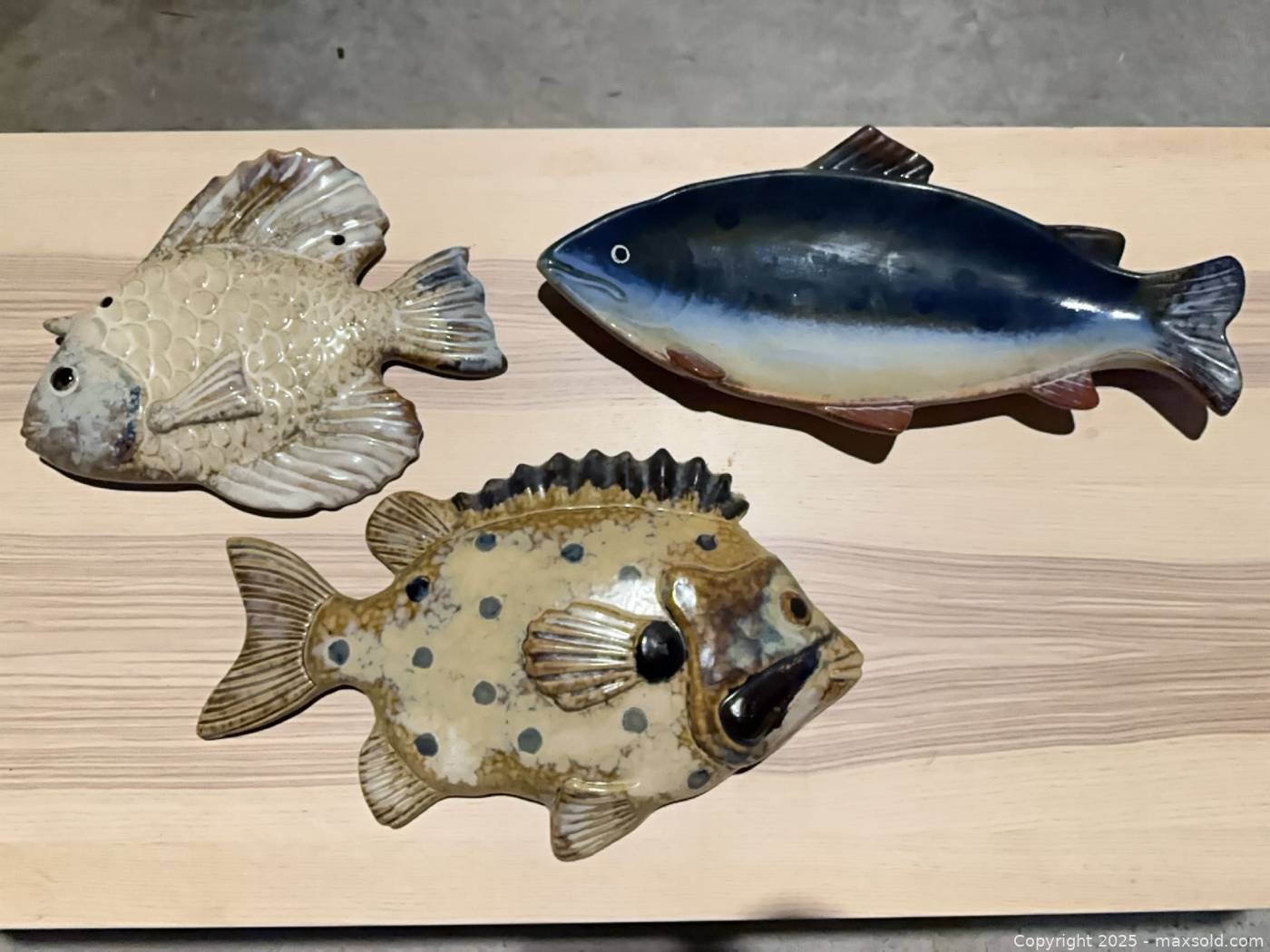 Three vintage glazed ceramic fish wall plaques | Maxsold