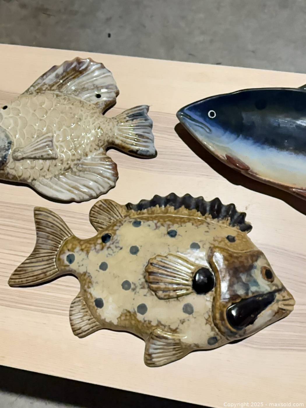 Three vintage glazed ceramic fish wall plaques | Maxsold