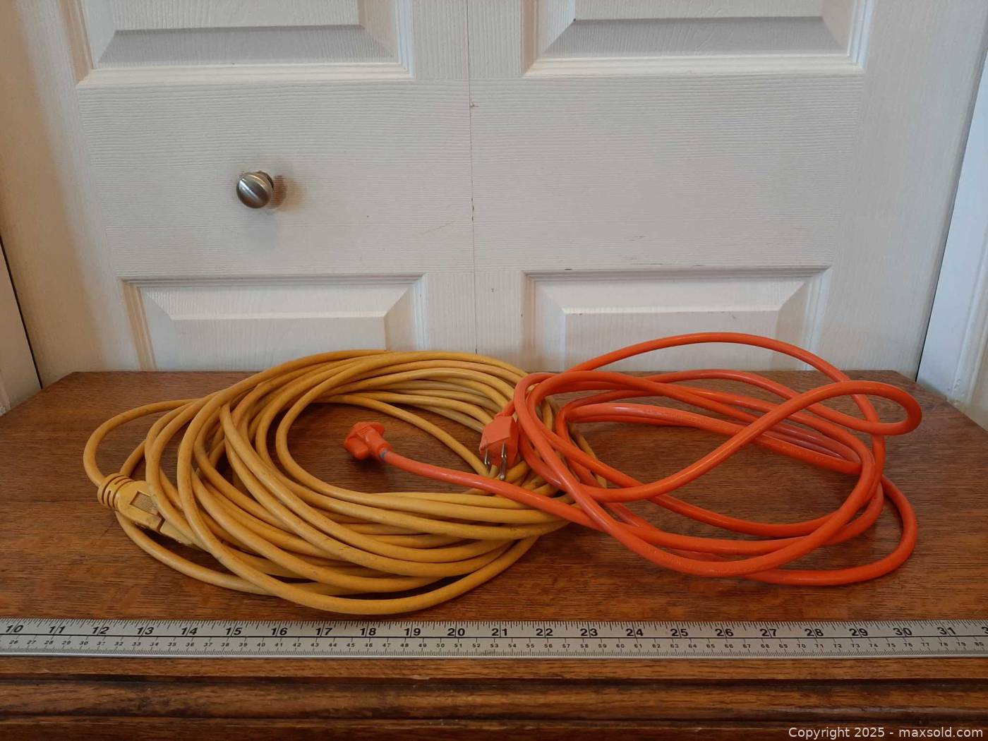 Two extension cords | Maxsold