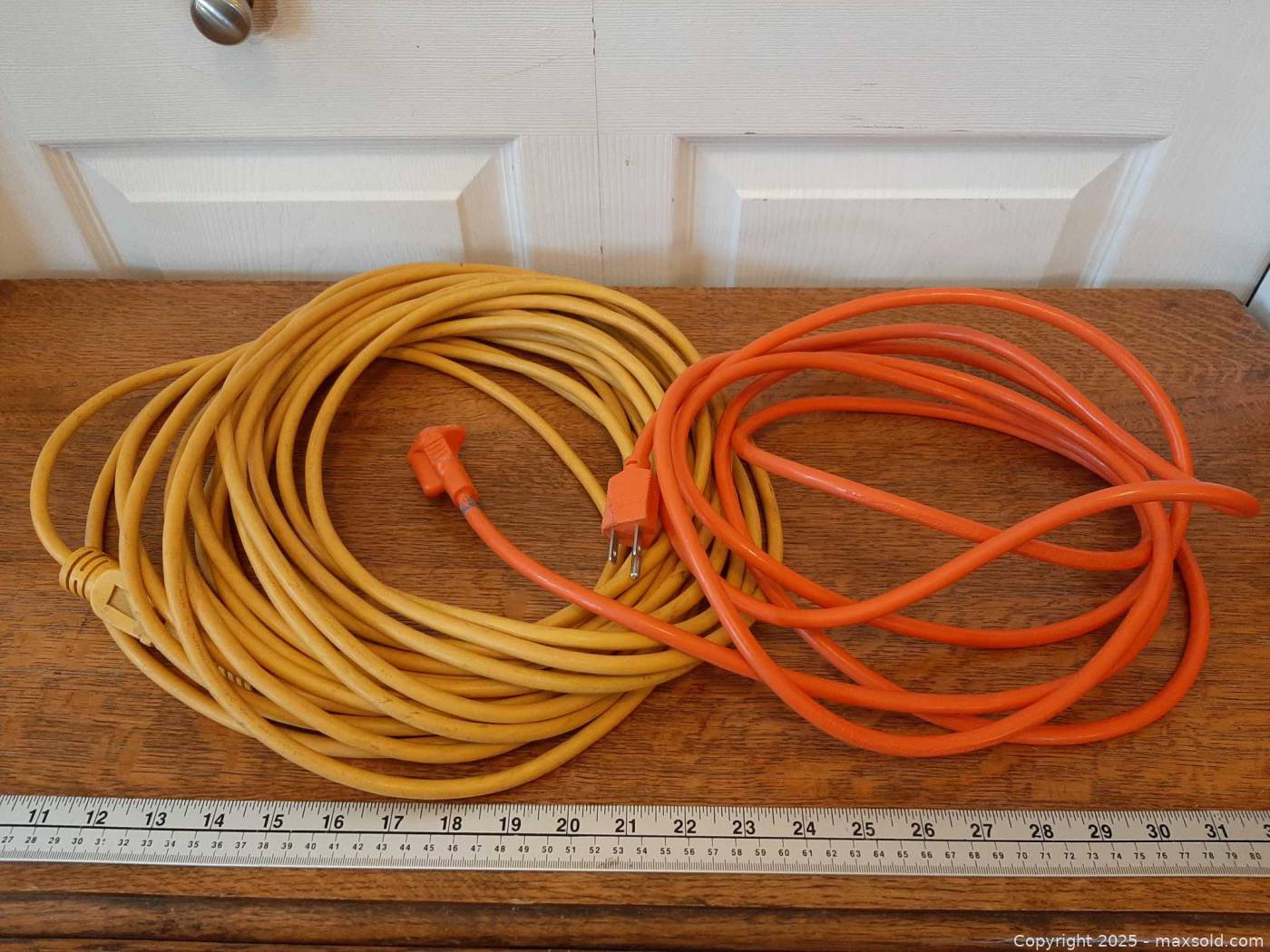 Two extension cords | Maxsold