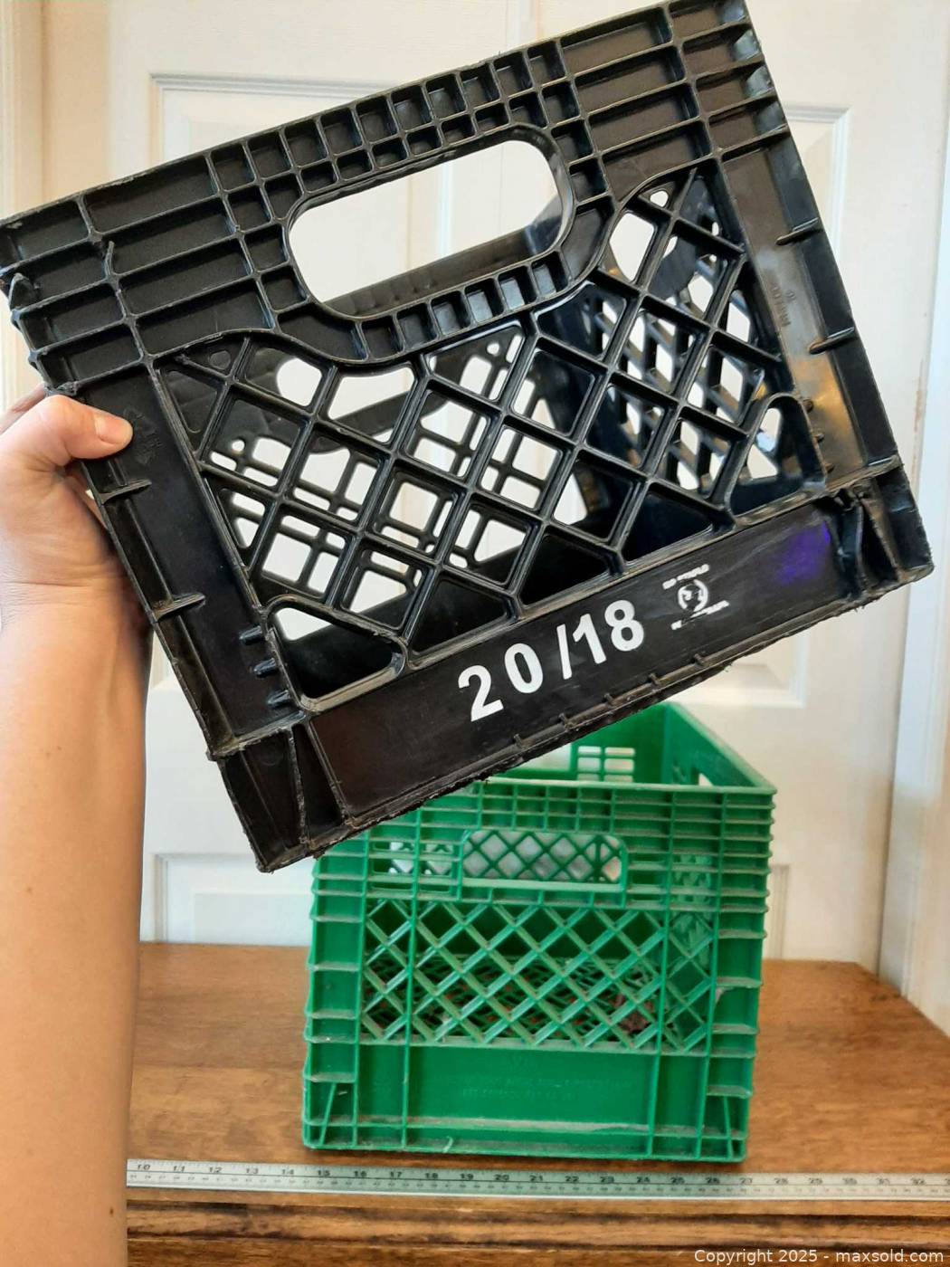 Two stackable plastic milk crates | Maxsold