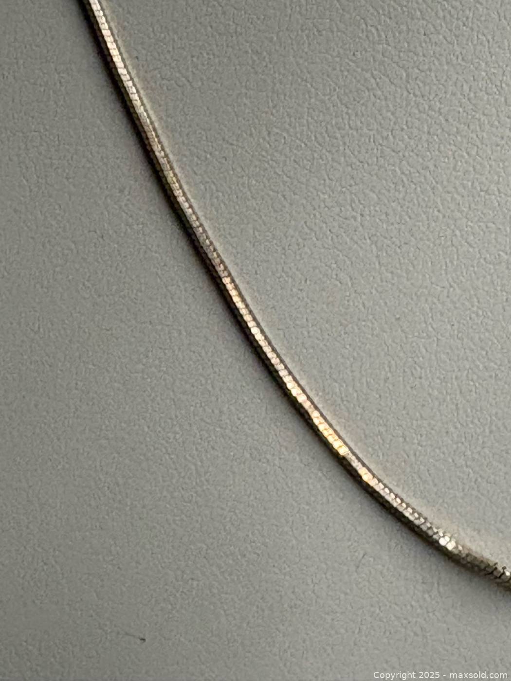 Four marked 925 sterling silver chains | Maxsold