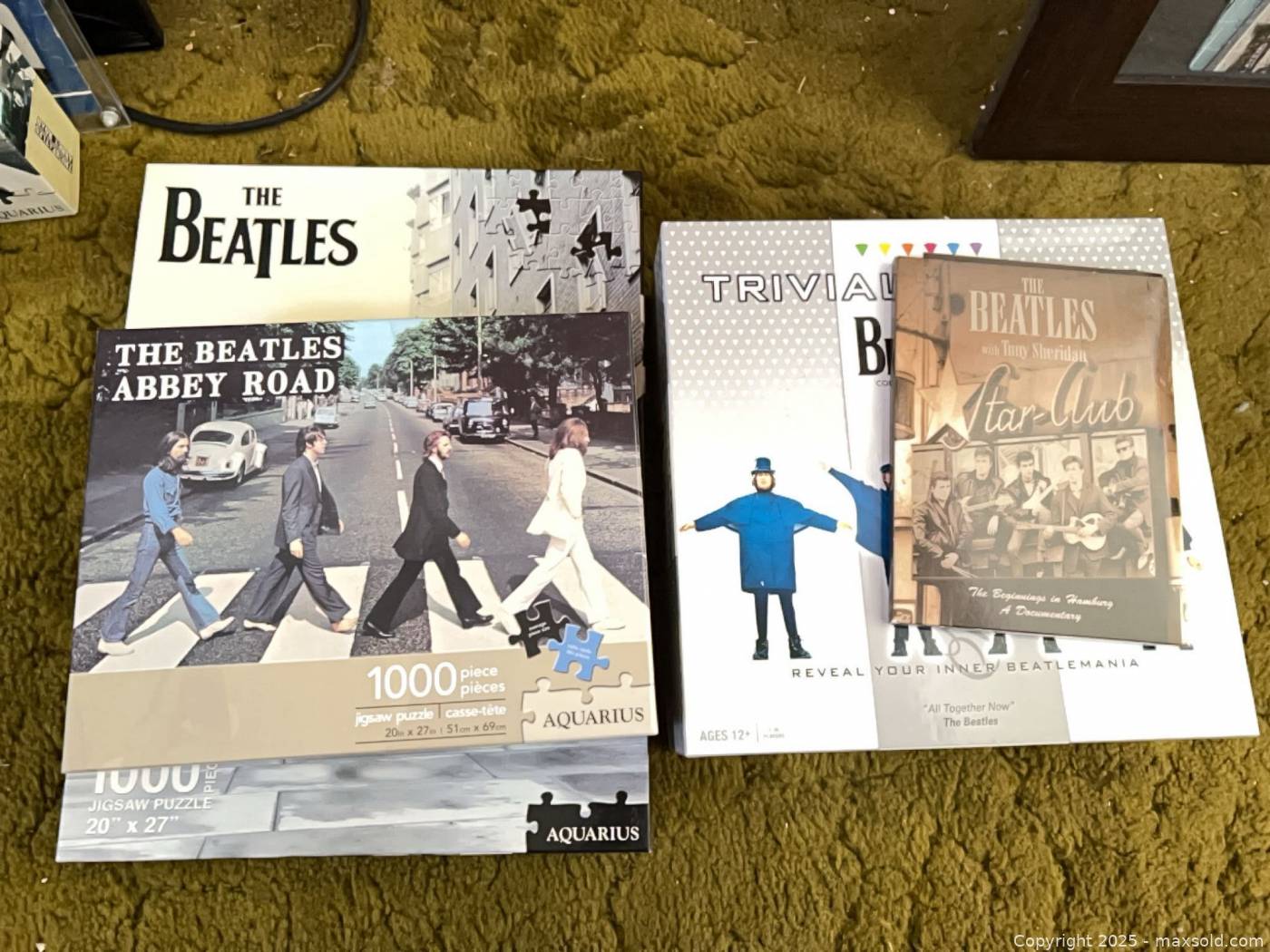 Beatles puzzles, Trivial Pursuit game and DVD | Maxsold
